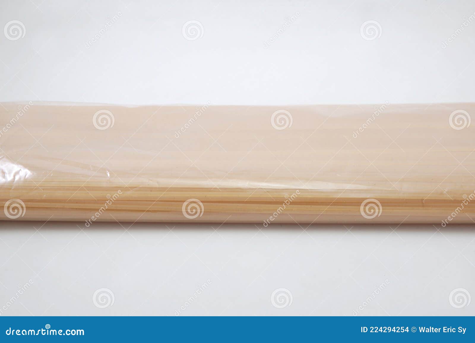 Raw Long Sticks Spaghetti Noodle Pasta in Plastic Pack Stock Photo ...