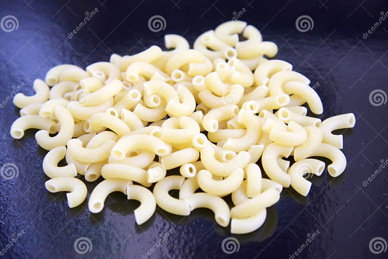 Raw macaroni stock image. Image of shells, pieces, macaroni - 5698375
