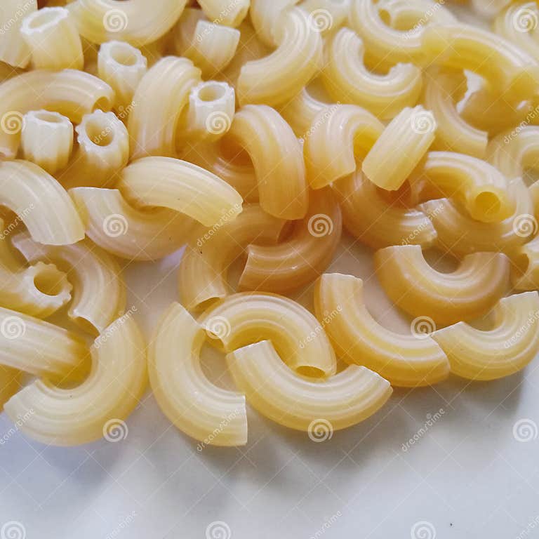 Raw Macaroni Noodles stock photo. Image of food, dish - 282122914