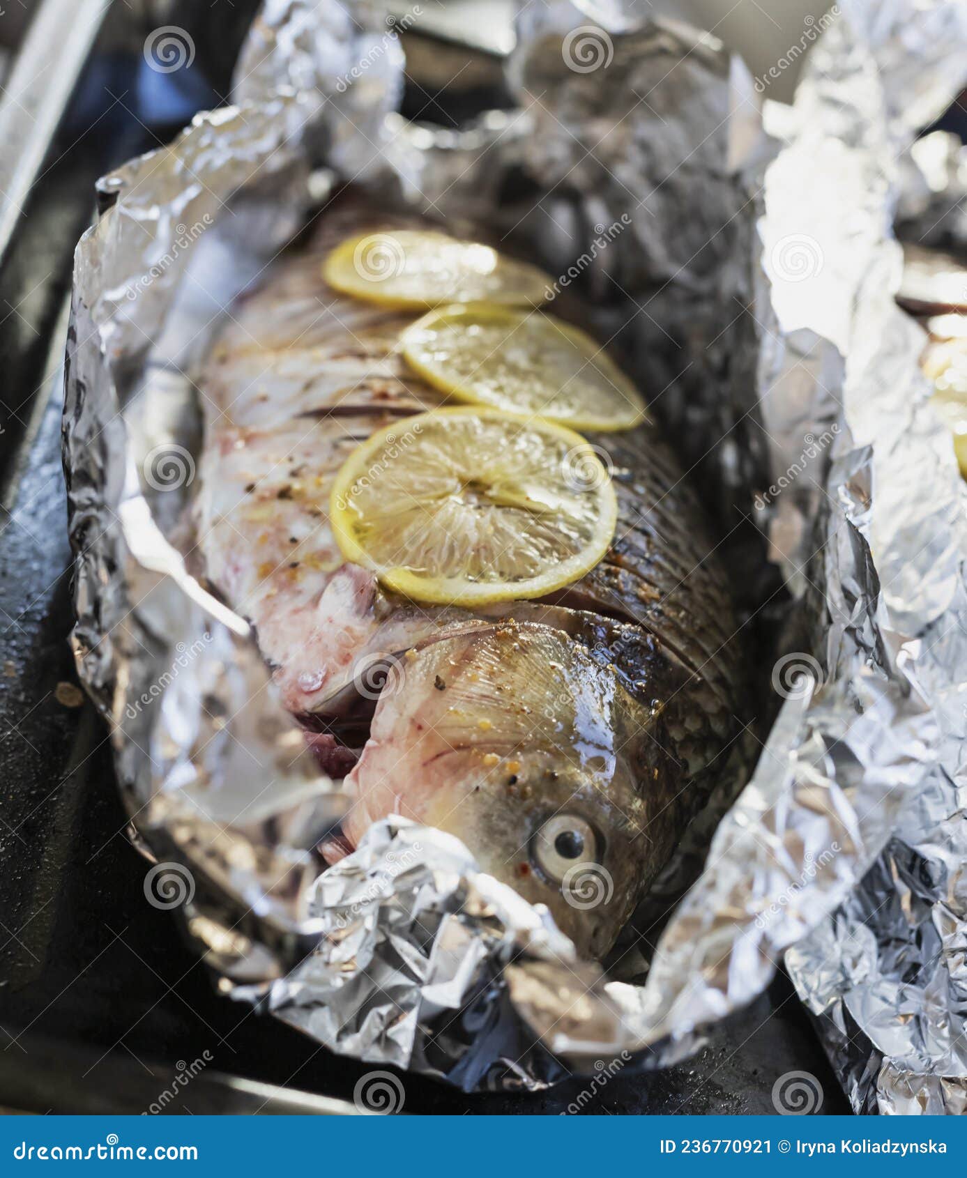 Raw Marinated Fish with Spices and Lemons Ready for Roasting Stock ...
