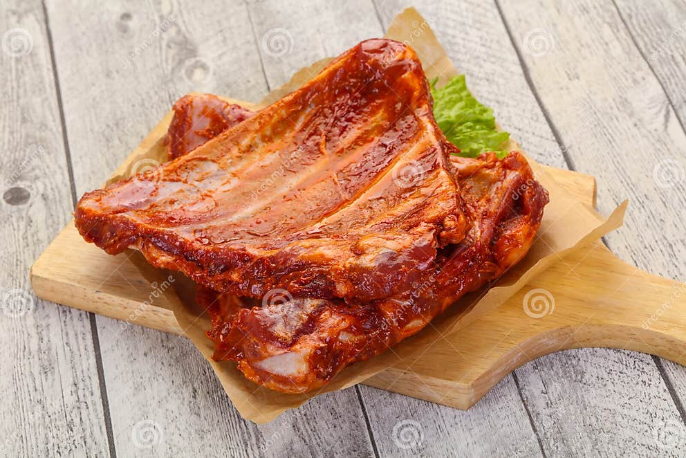 Raw marinated pork ribs stock image. Image of muscle - 179259999