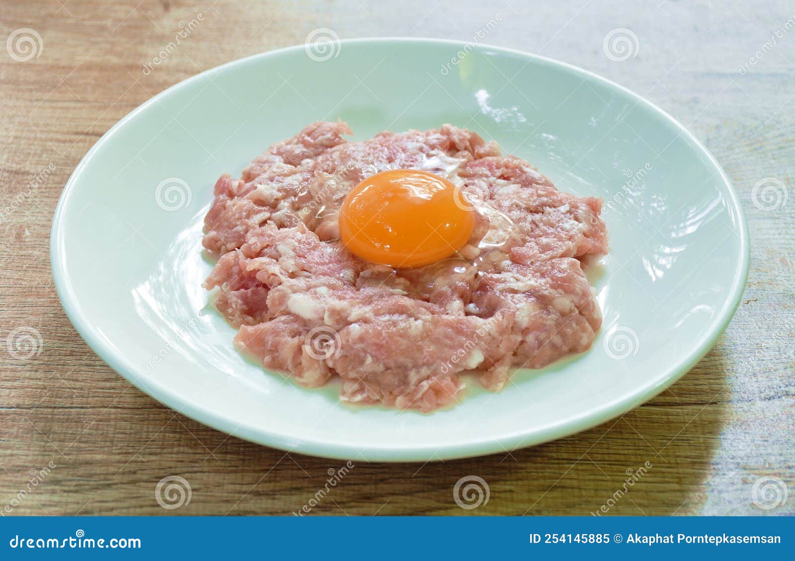 Raw Mashed Pork Ingredient Food Tooping Eggg Yolk on Plate Stock Image ...