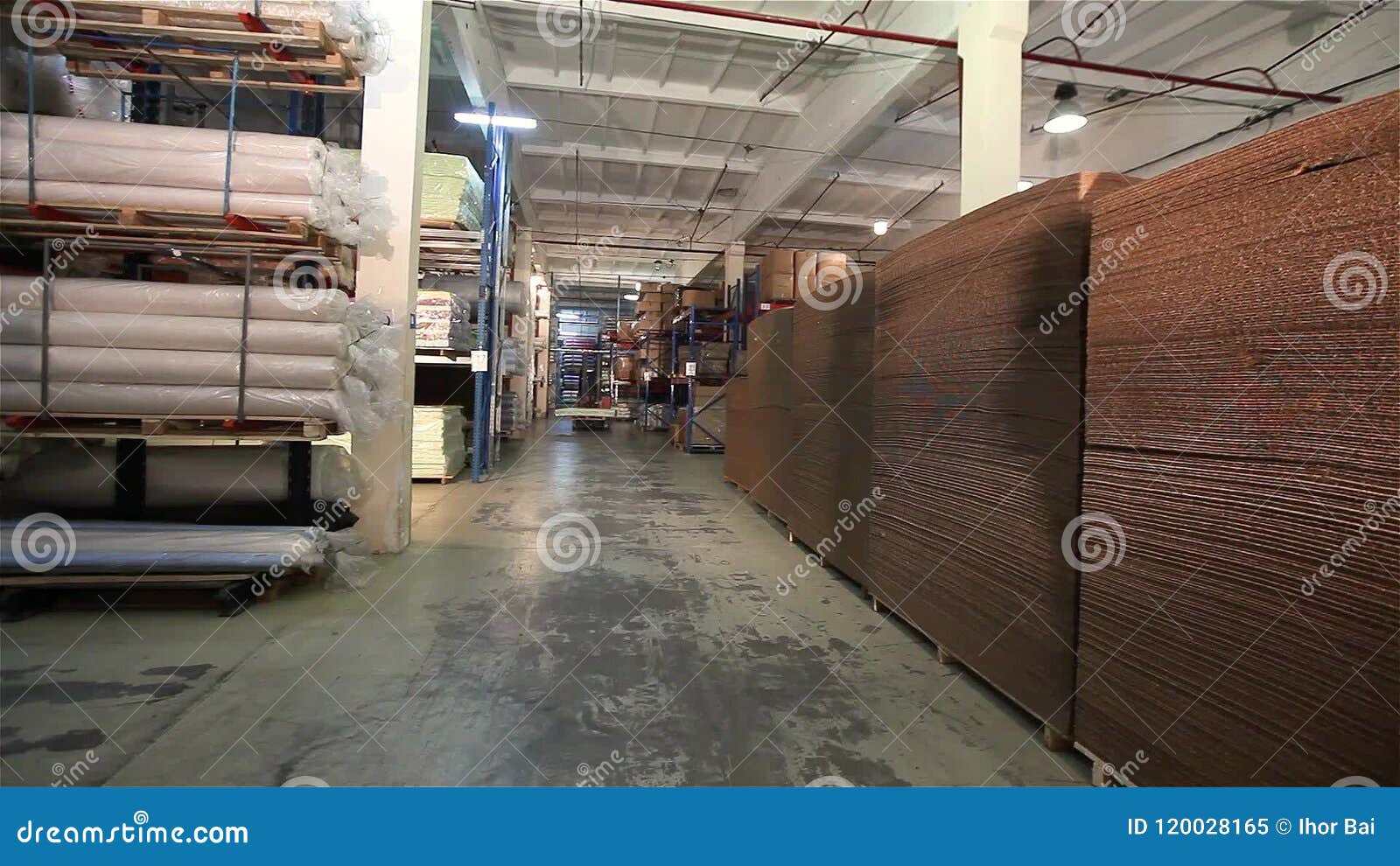 Rolls of Fabrics and Sheets of Coconut are Stored in the Raw Materials ...