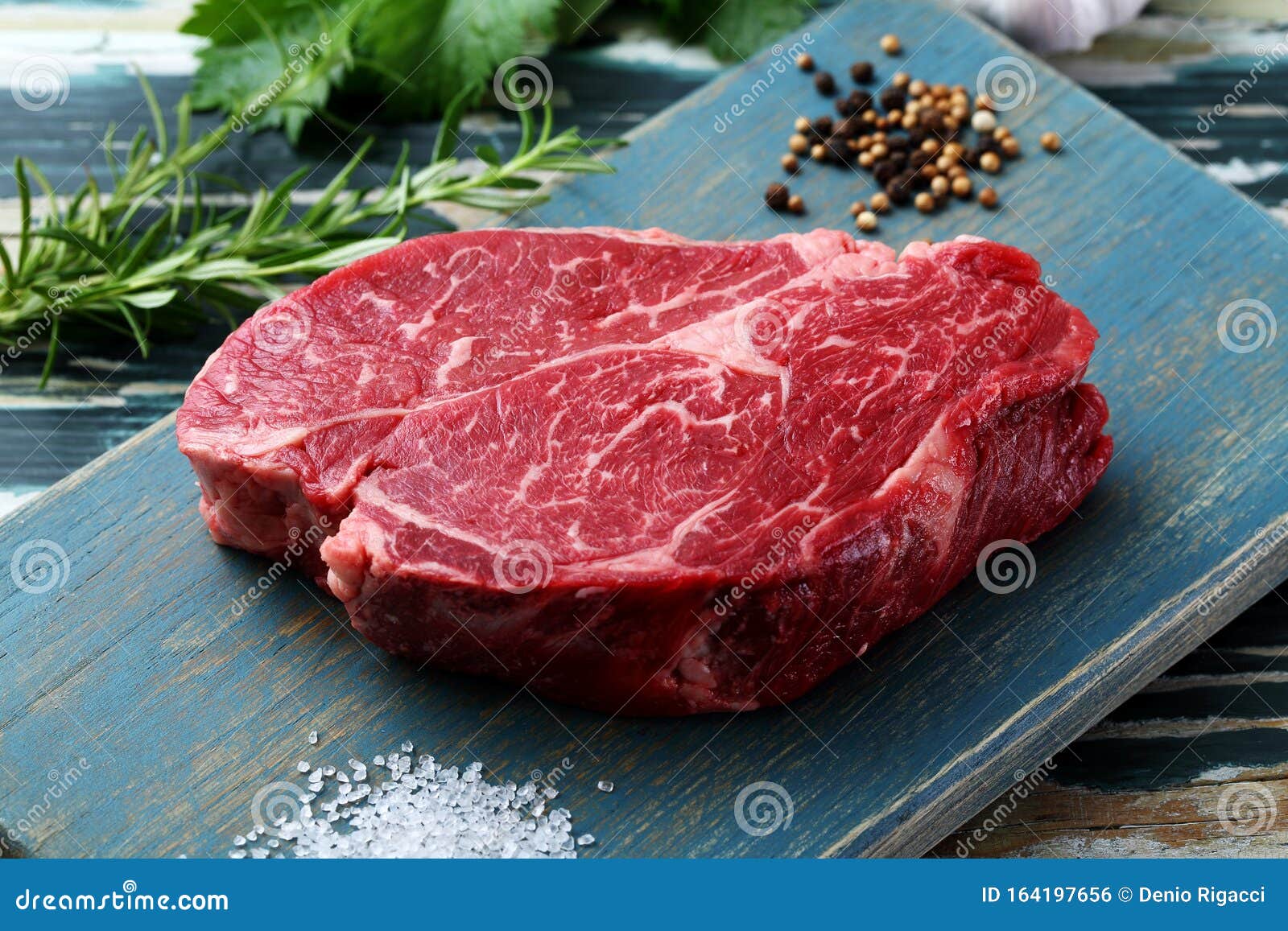 Raw Meat Beef Steak on Green Rustic Table Stock Photo - Image of diet ...