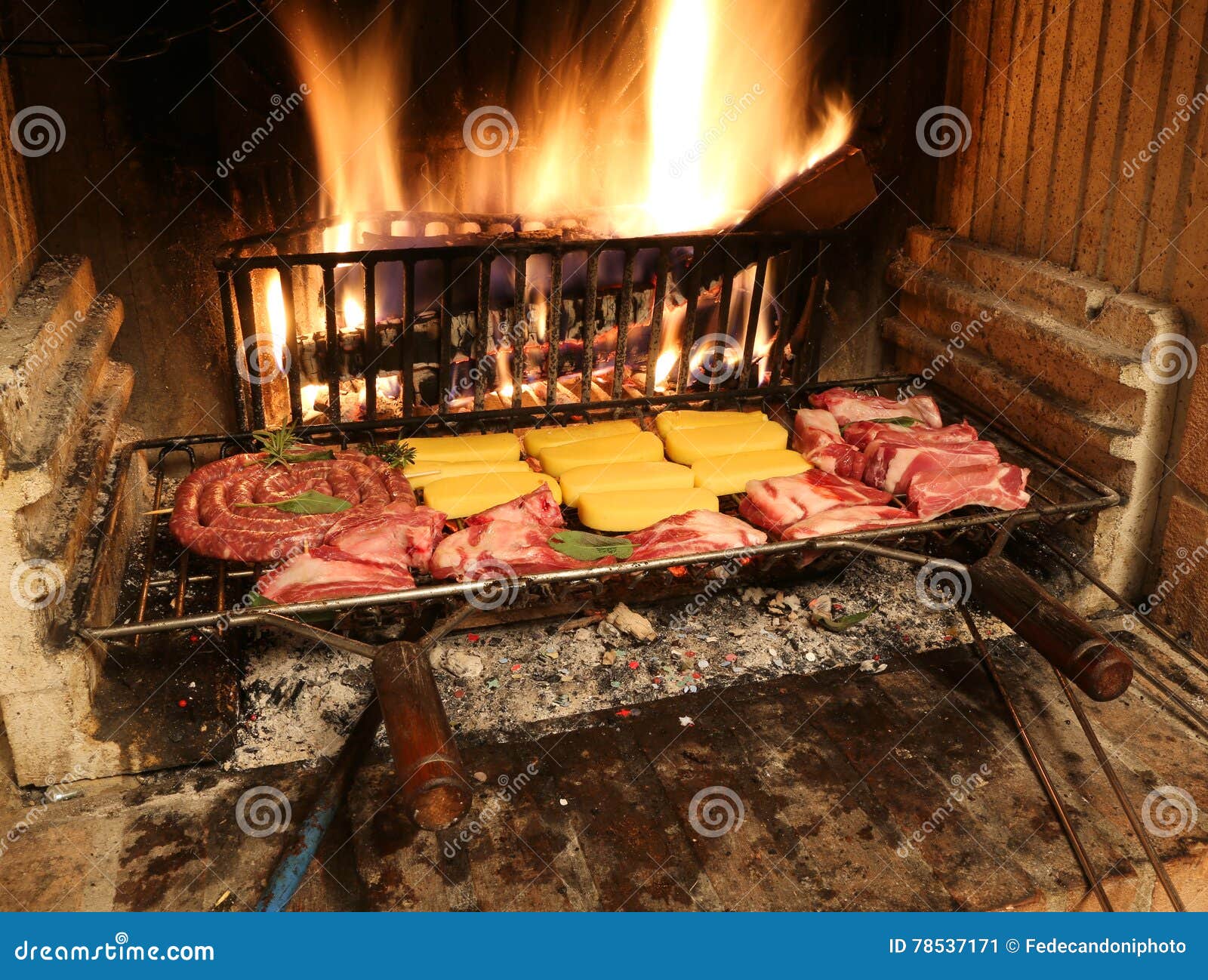 Raw Meat Cooking in the Fireplace with a Warm Fire Lit Stock Image ...