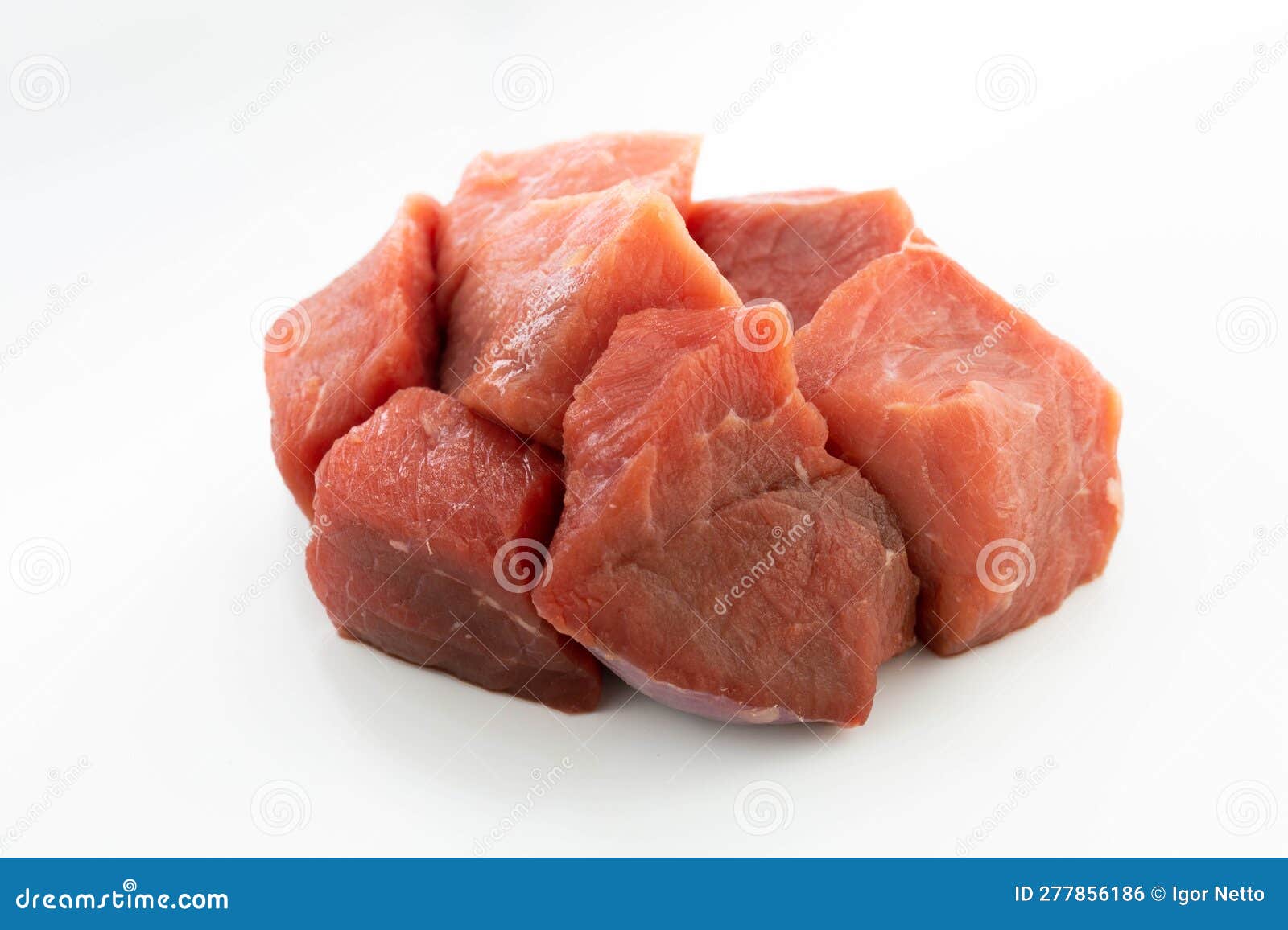 Bunch of Raw Meat Cubes, Isolated Front View Stock Photo - Image of ...
