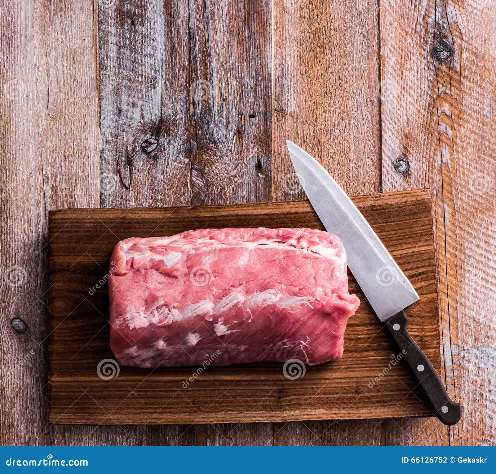 Raw meat on cutting board stock photo. Image of wooden - 66126752