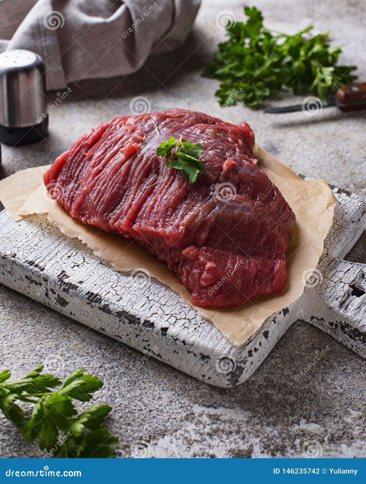 Raw meat on cutting board stock photo. Image of preparation - 146235742