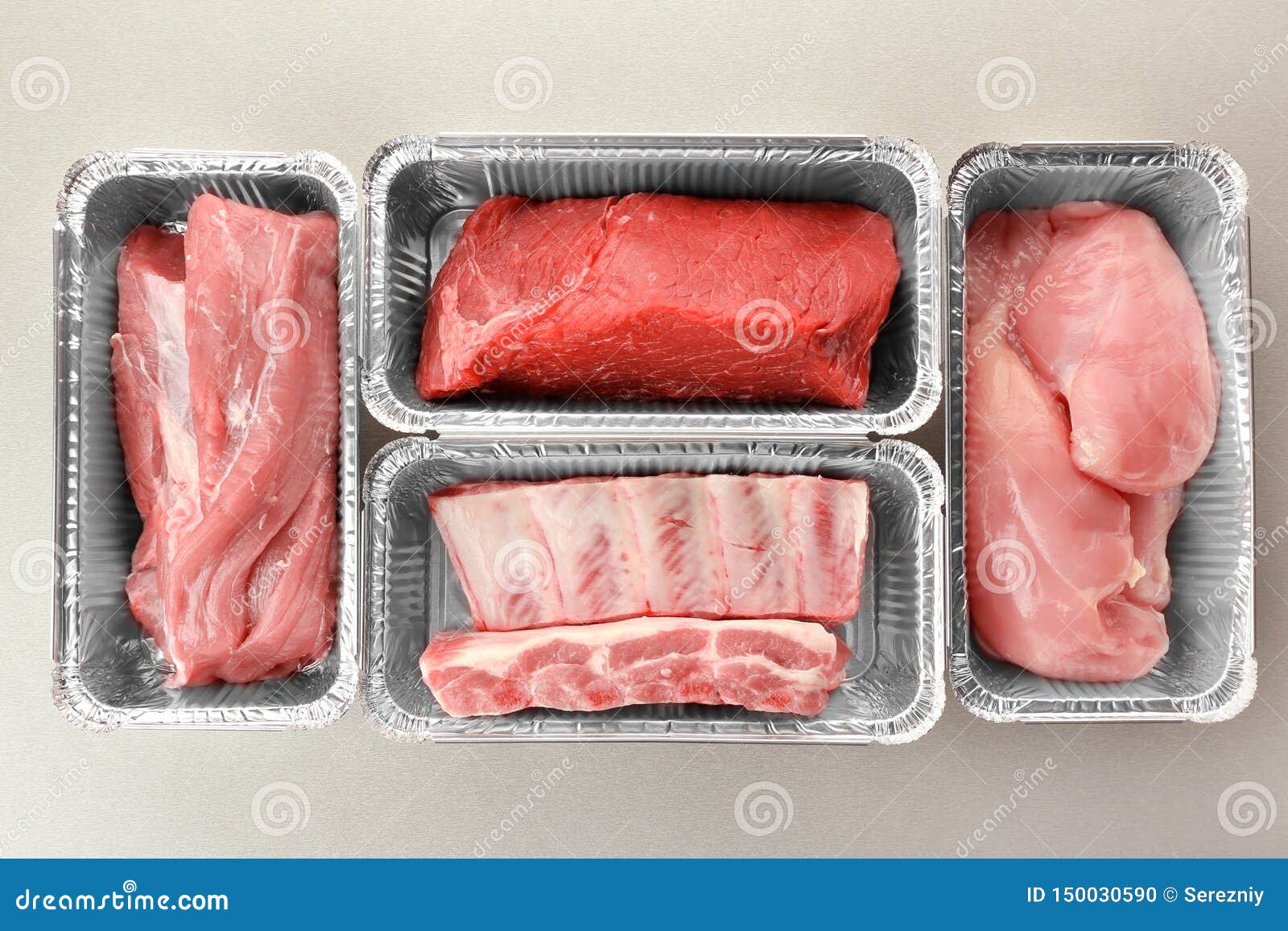 Raw Meat in Foil Containers on Light Background Stock Photo - Image of ...