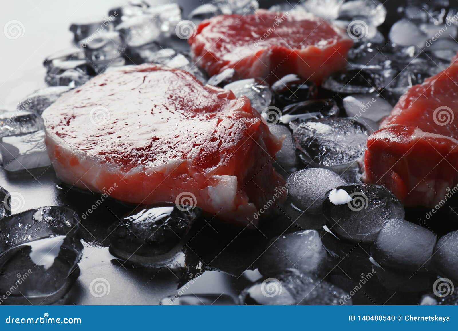 Raw meat and ice cubes stock photo. Image of fresh, clear - 140400540