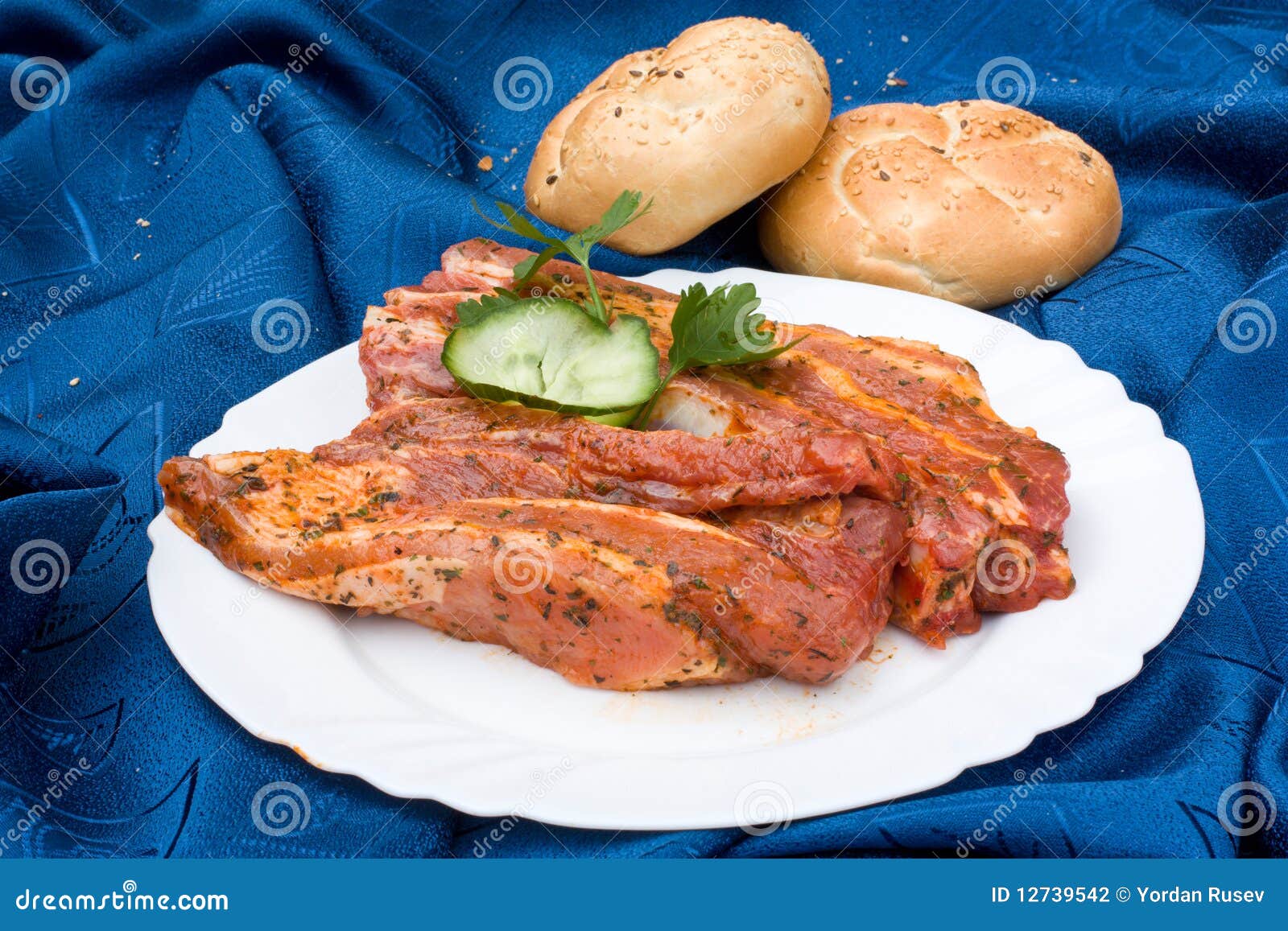 Raw Meat with Loafs of Bread Stock Photo - Image of roast, bread: 12739542