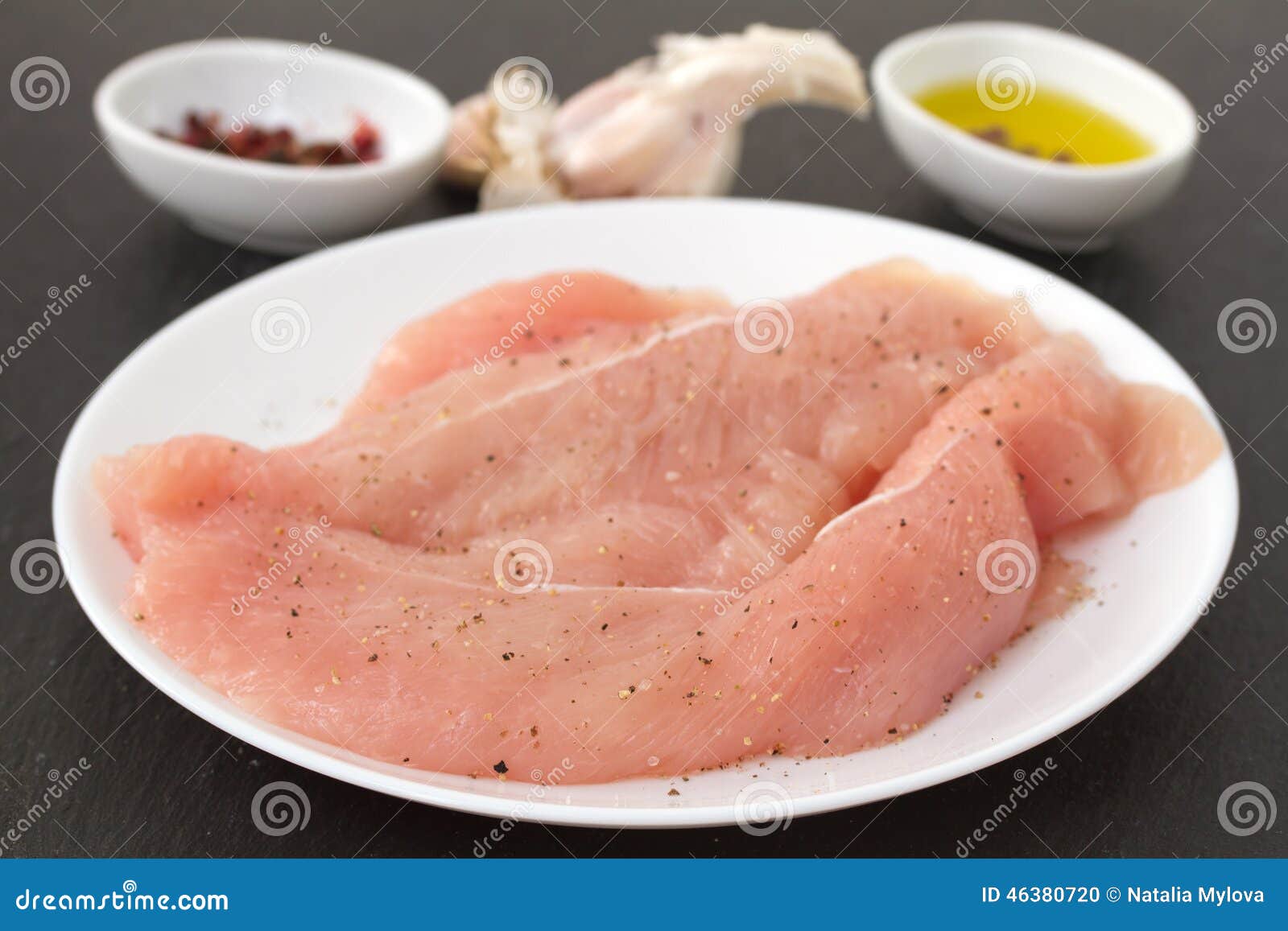 Raw meat on plate stock photo. Image of uncooked, pepper - 46380720