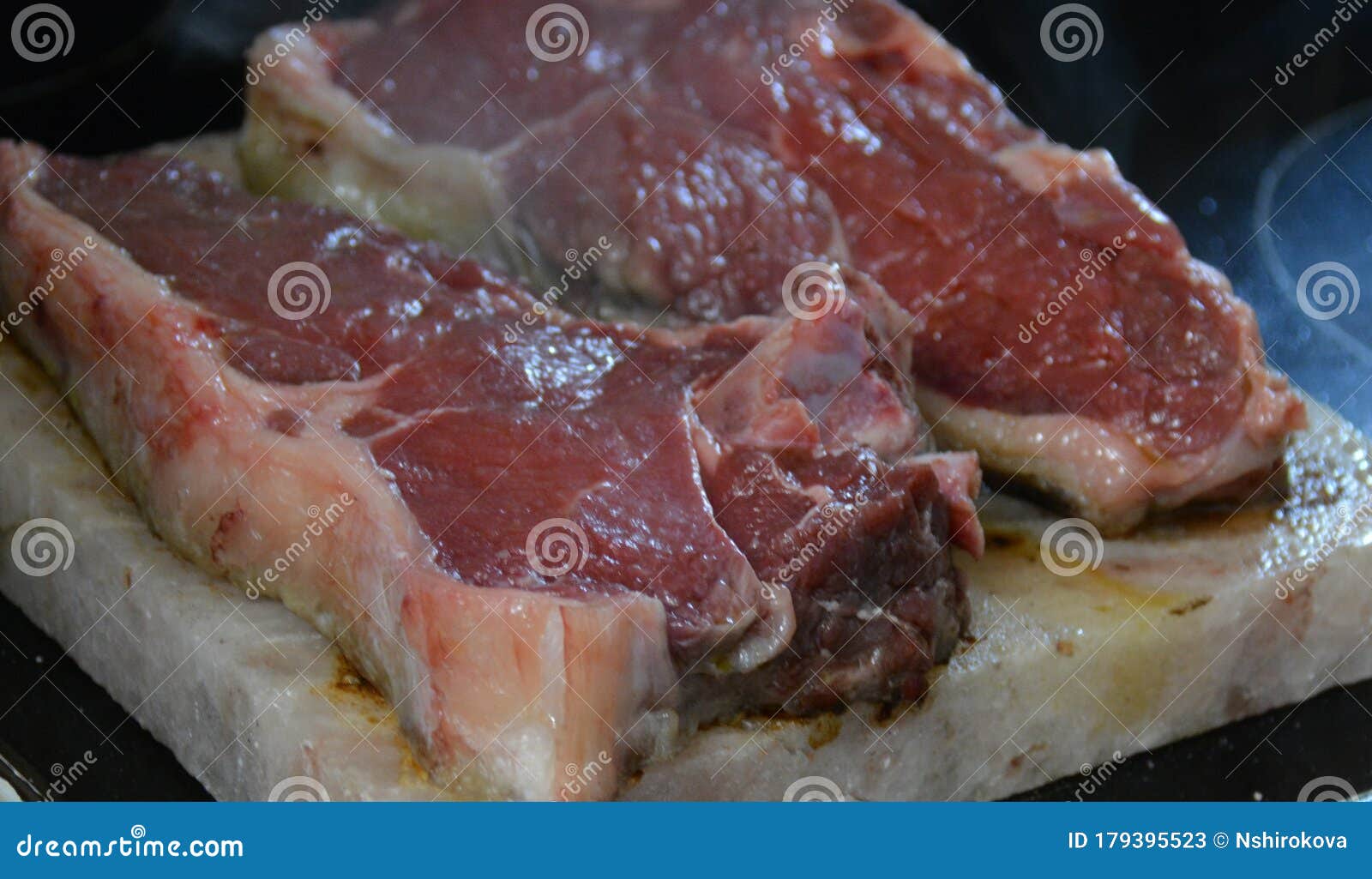 Raw meat on the salt plate stock image. Image of plate - 179395523
