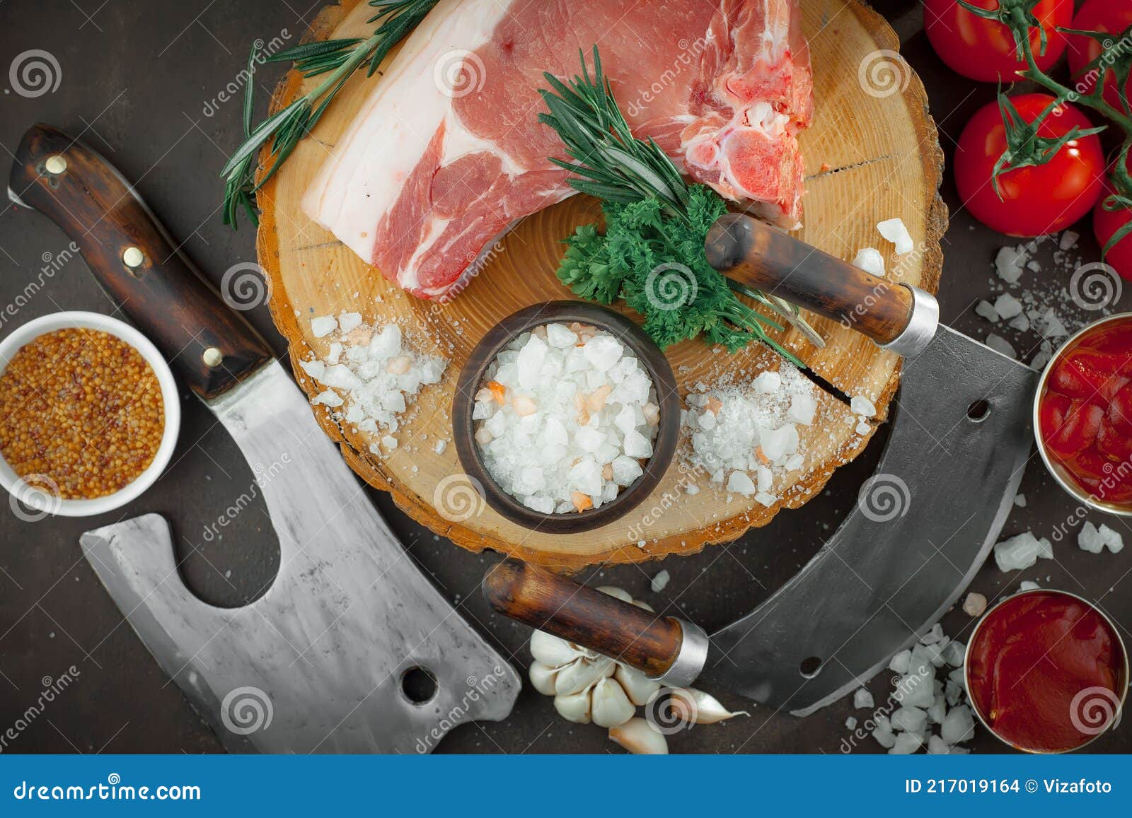 Meat with Kitchen Accessories on an Old Background. Stock Photo - Image ...