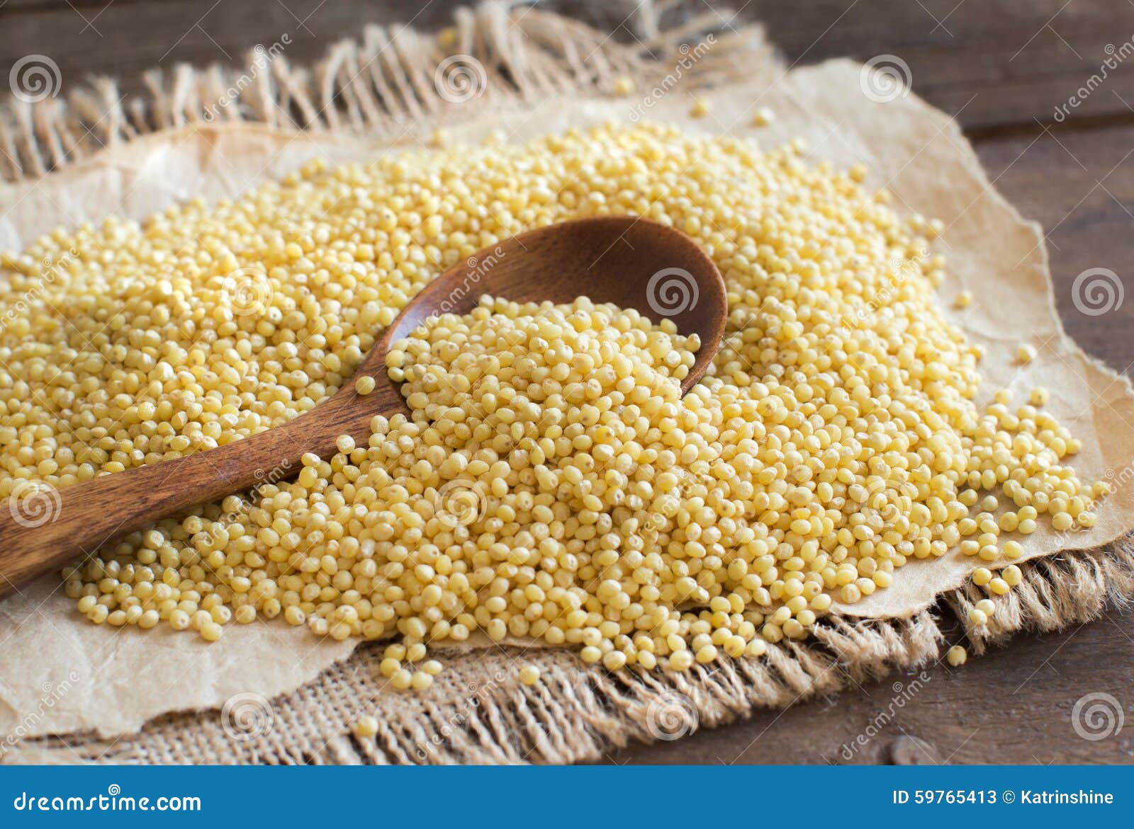 Raw millet with a spoon stock image. Image of kernels - 59765413