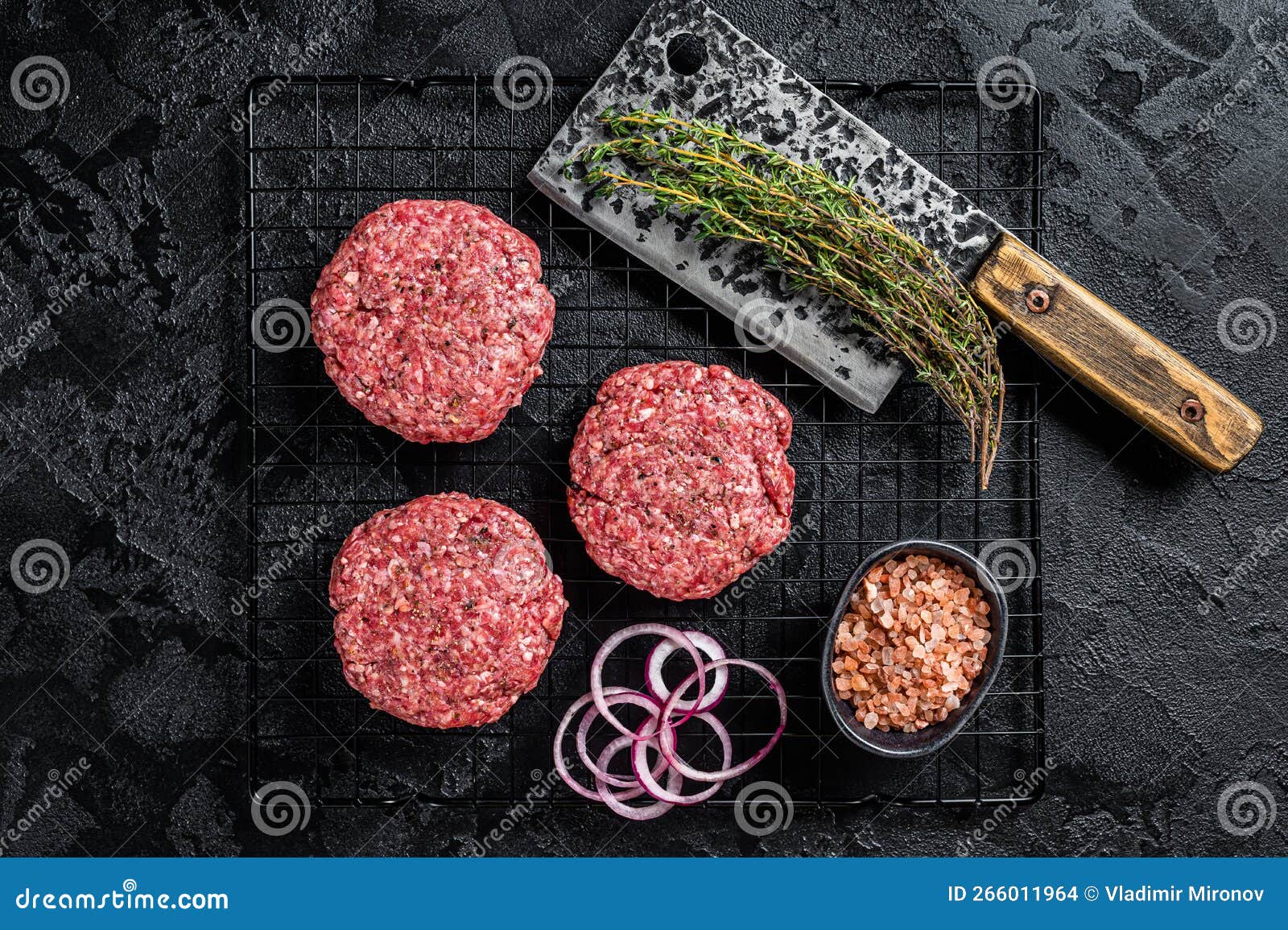 Raw Minced Beef Cutlets with Spices and Herbs Ready for Cooking. Black ...