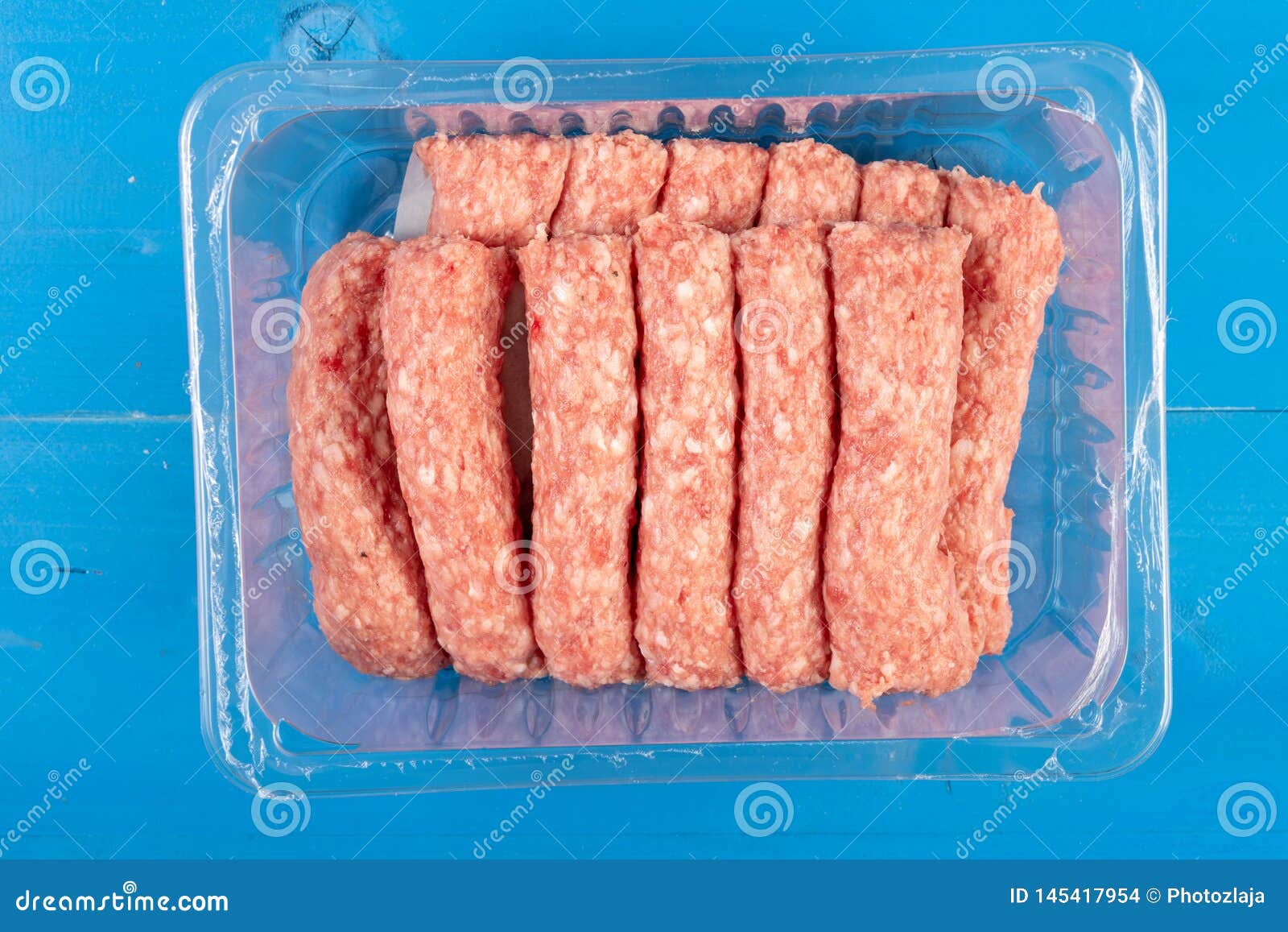 Raw Minced Meat Kebabs Above Blue Wooden Boards Background Stock Photo ...