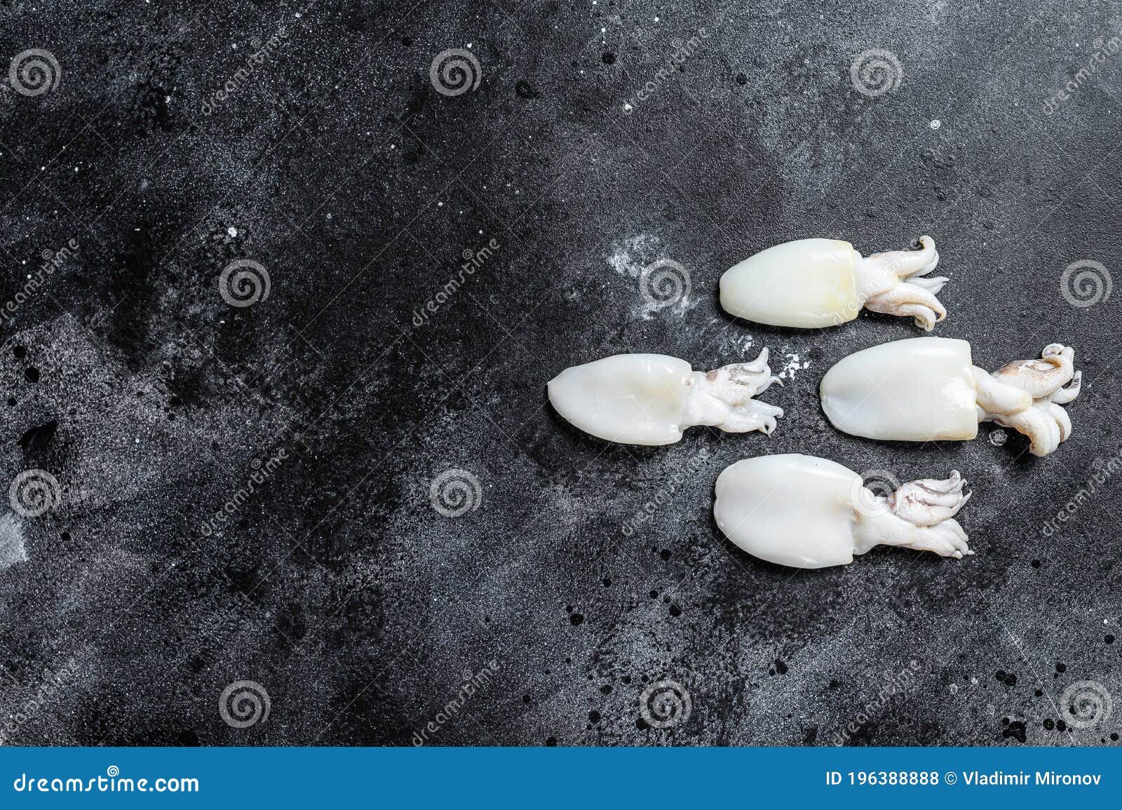 Raw Mini Cuttlefish on the Table. Black Background. Top View Stock ...