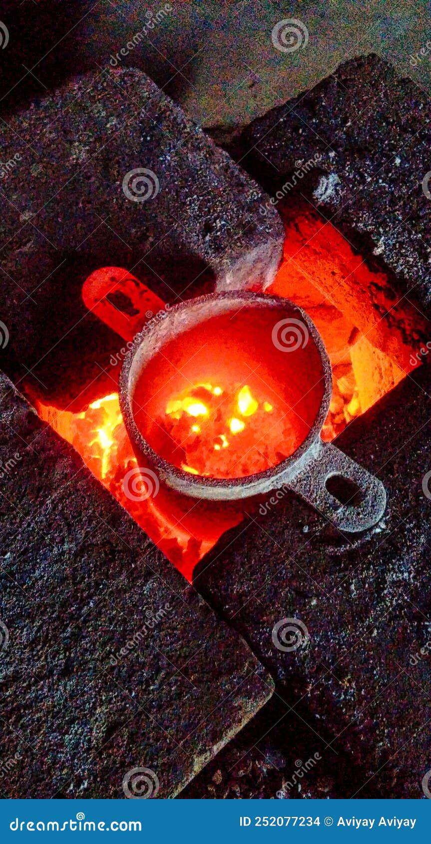 Raw Molten Aluminum in Primitive Forge, at Night Stock Photo - Image of ...