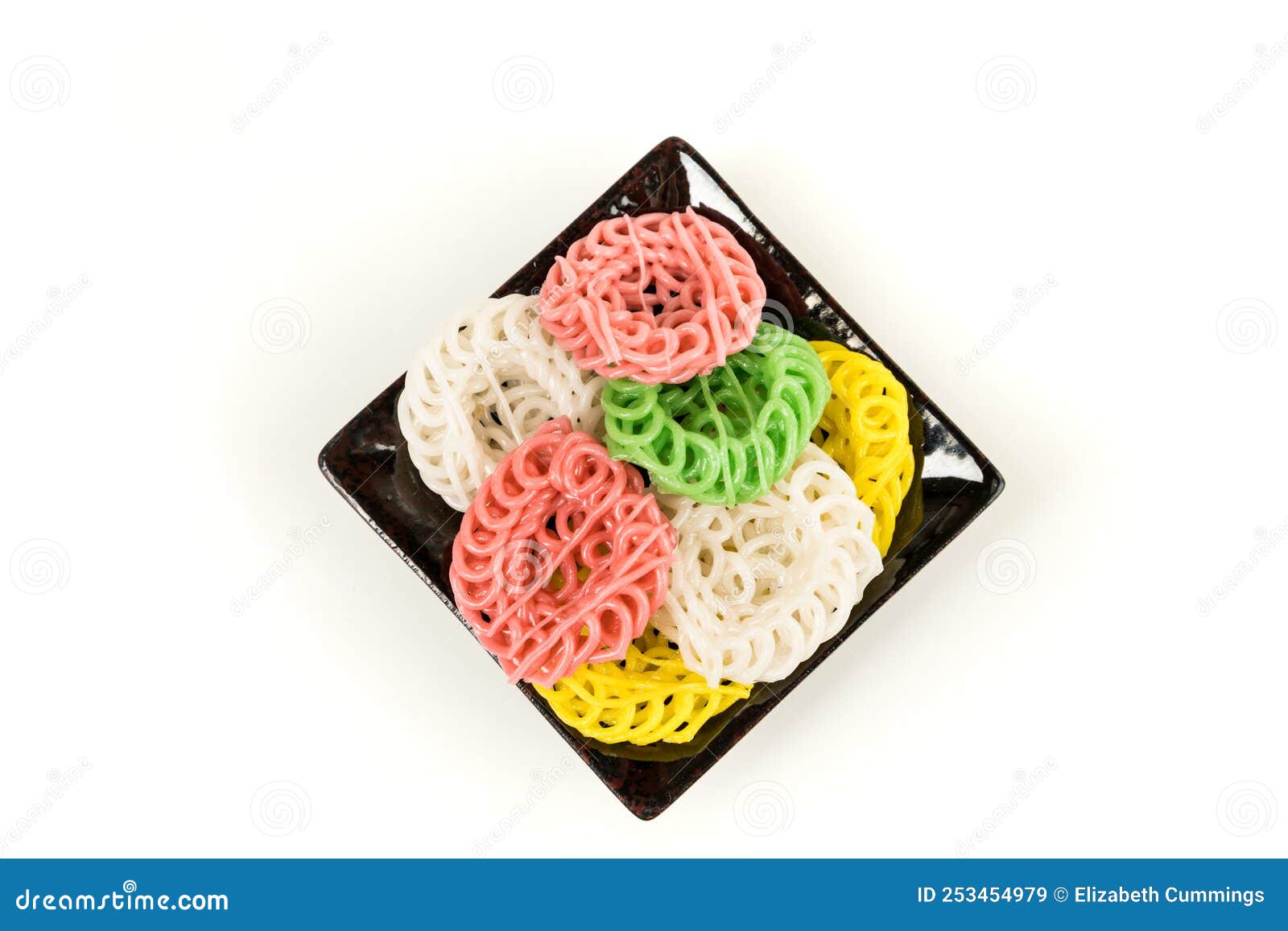 Raw Multicolored Tapioca Crackers on a Ceramic Plate Top Down Isolated ...