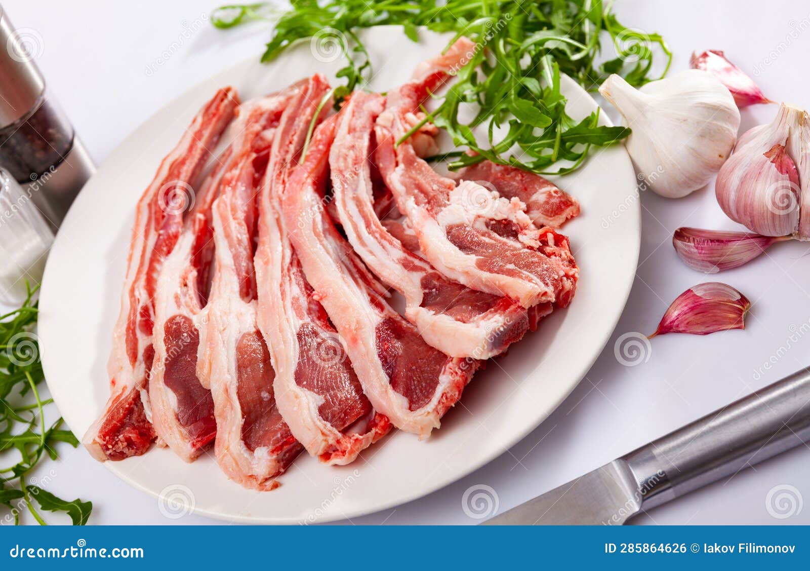 Raw Mutton Chops on Plate with Herbs and Spices Stock Photo - Image of ...