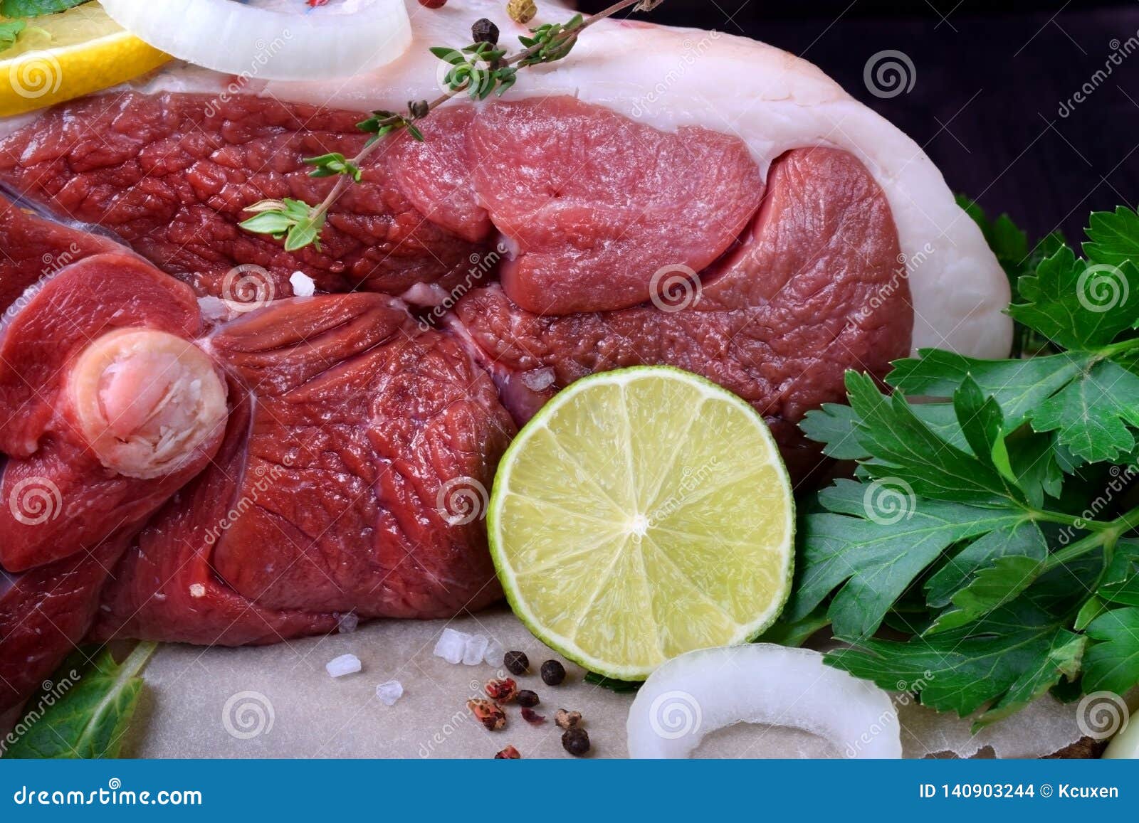 Raw mutton leg stock photo. Image of cuisine, board - 140903244