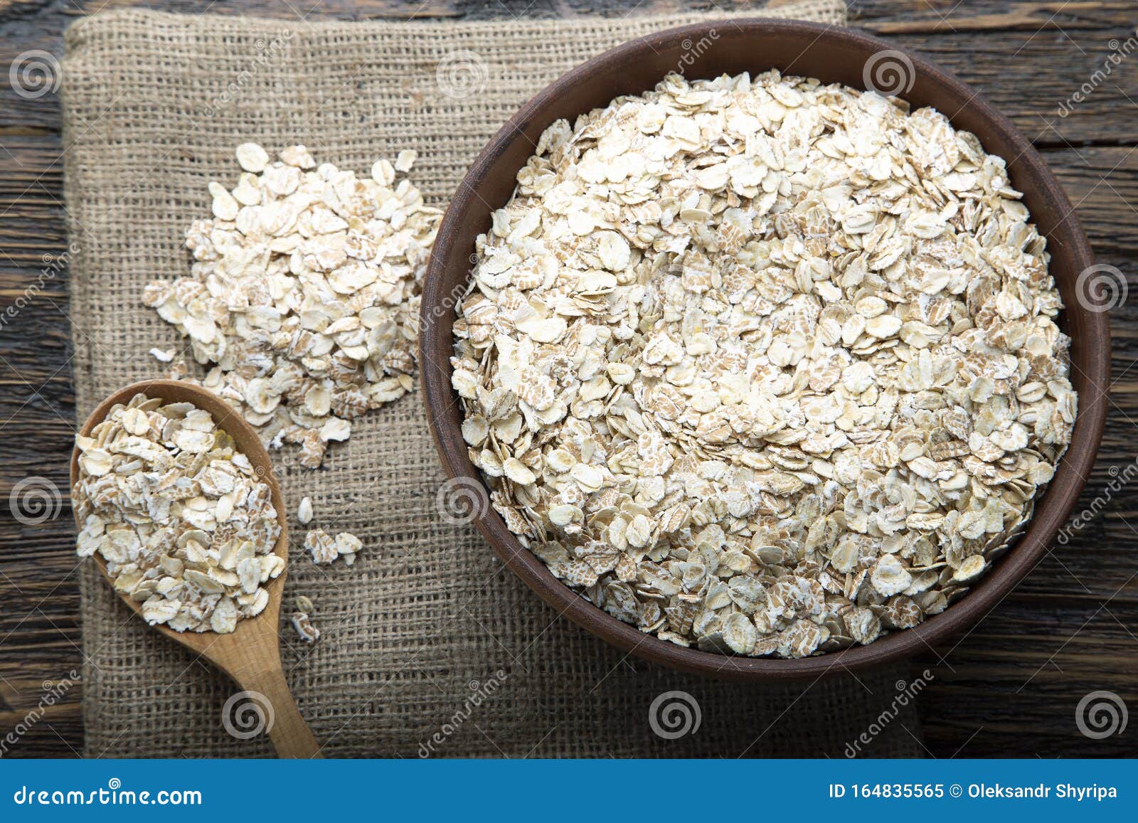 Raw oatmeal in a plate stock image. Image of food, grain - 164835565