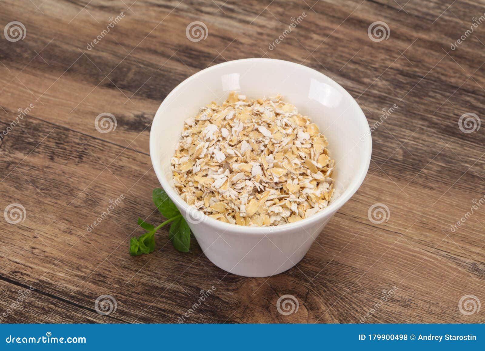 Raw oats in the bowl stock photo. Image of health, view - 179900498