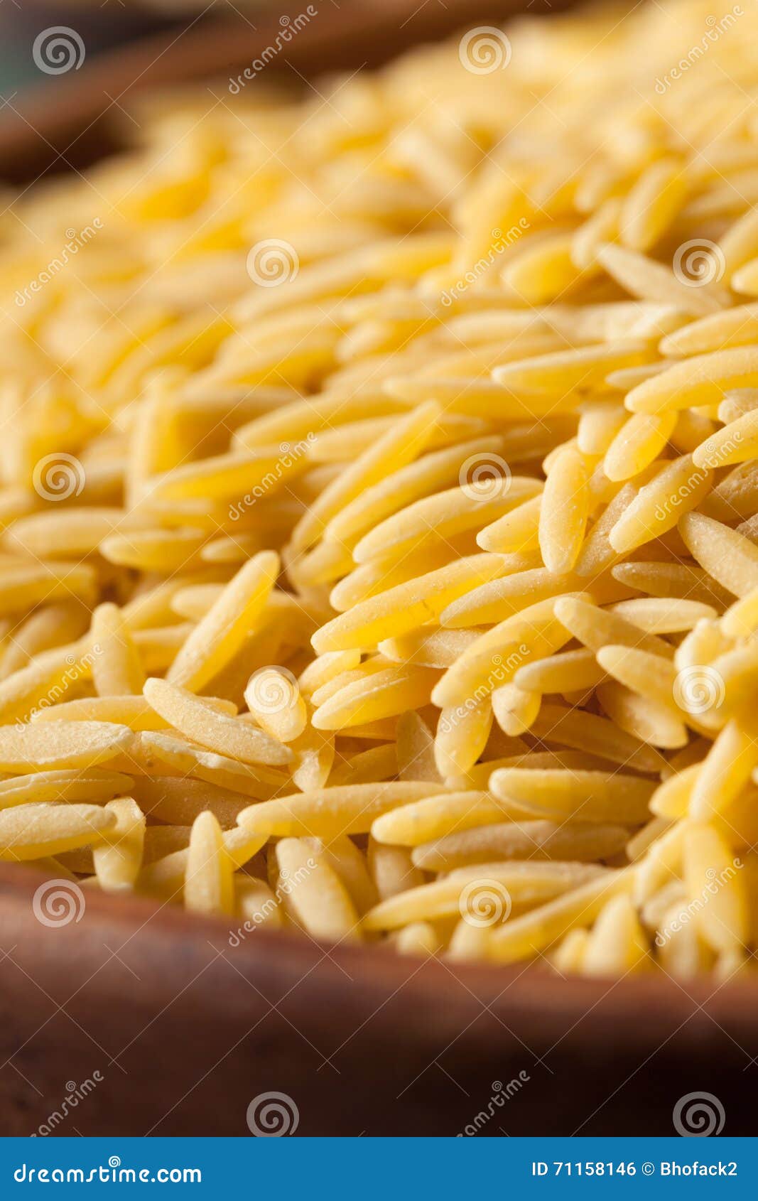 Raw Organic Orzo Pasta stock photo. Image of mediterranean - 71158146