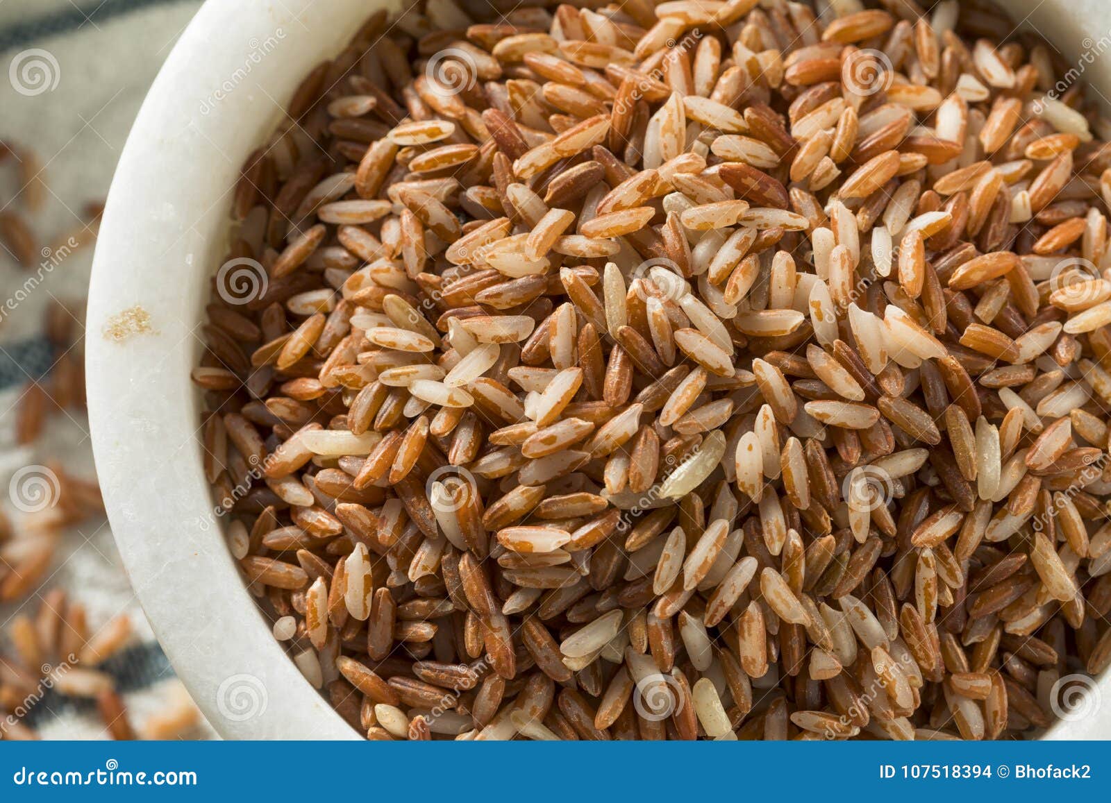 Raw Organic Red Rice stock photo. Image of nature, traditional - 107518394