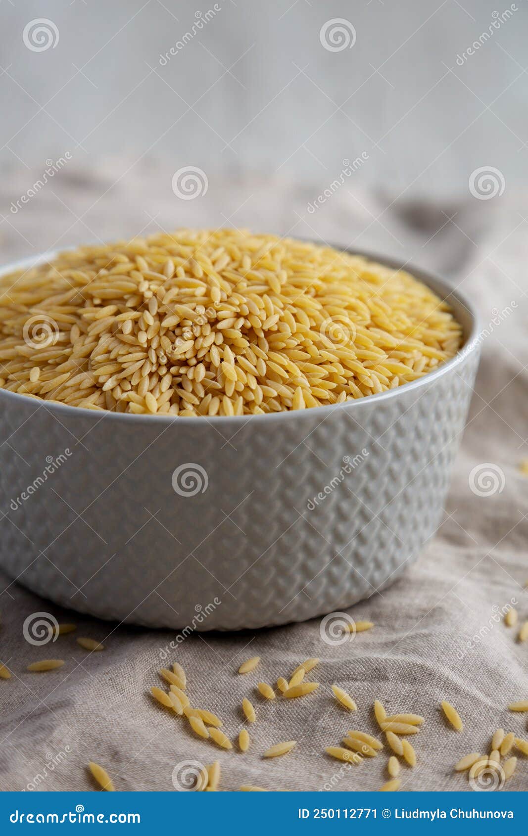 Raw Organic Risoni Pasta in a Bowl, Side View Stock Image - Image of ...