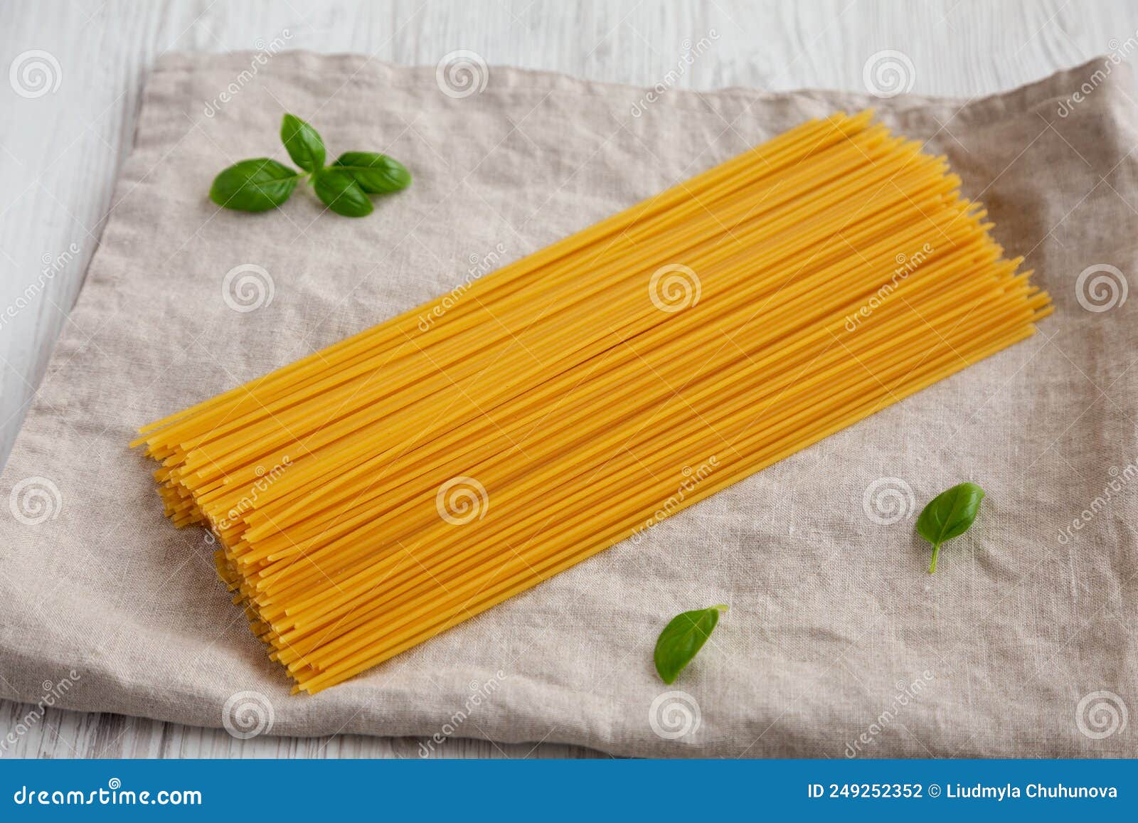 Raw Organic Spaghetti Pasta in a Bunch, Side View Stock Photo - Image ...