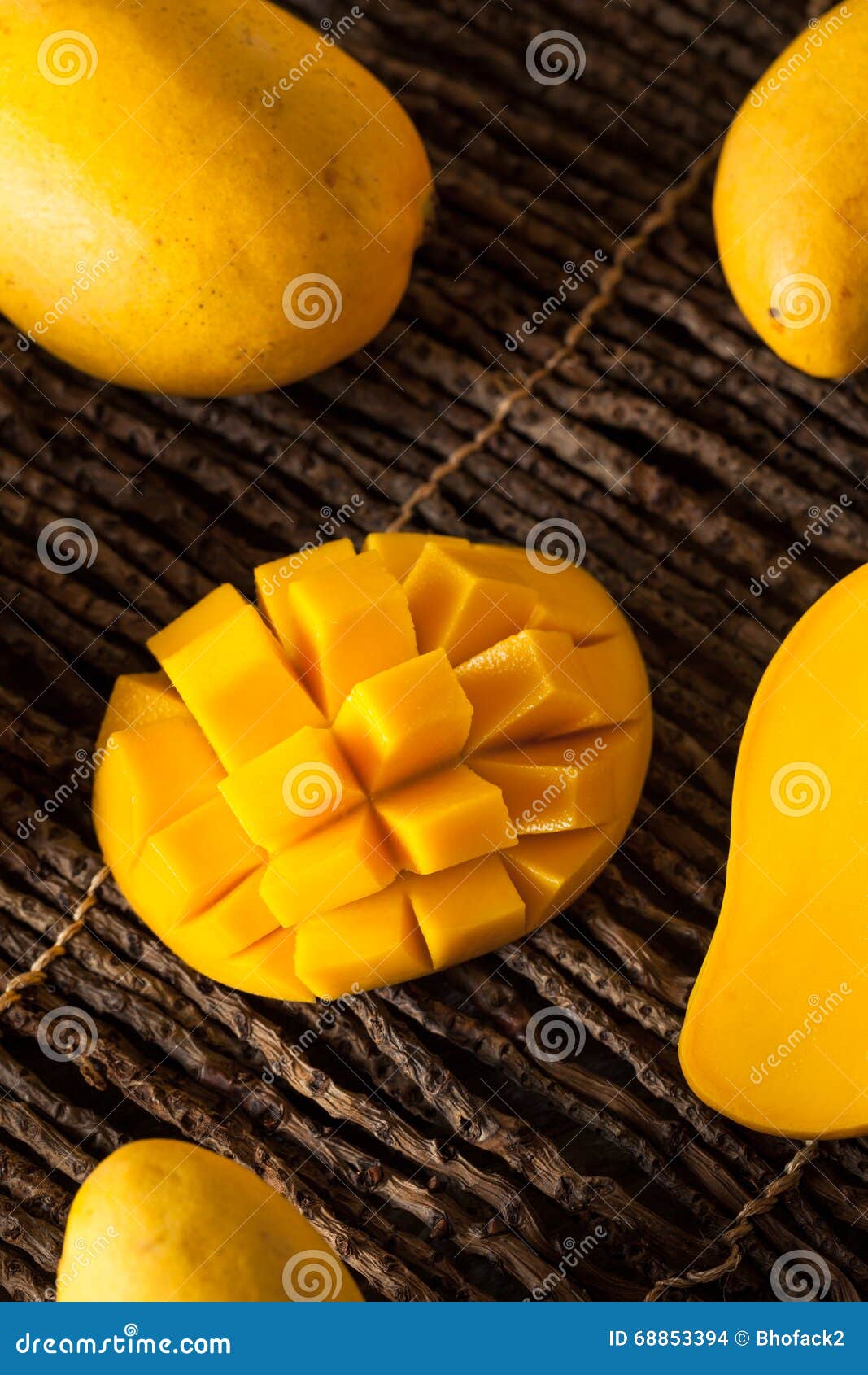 Raw Organic Yellow Mangos stock photo. Image of orange - 68853394