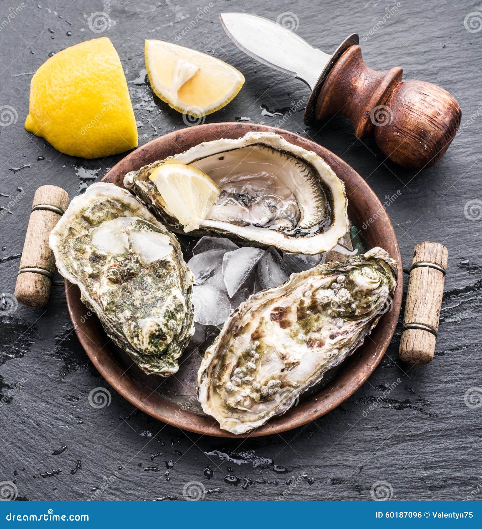 Raw Oysters on the Graphite Board. Stock Photo - Image of mollusk ...