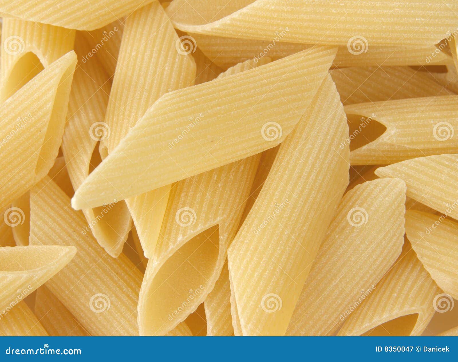 Raw pasta closeup stock image. Image of ingredient, yellow - 8350047