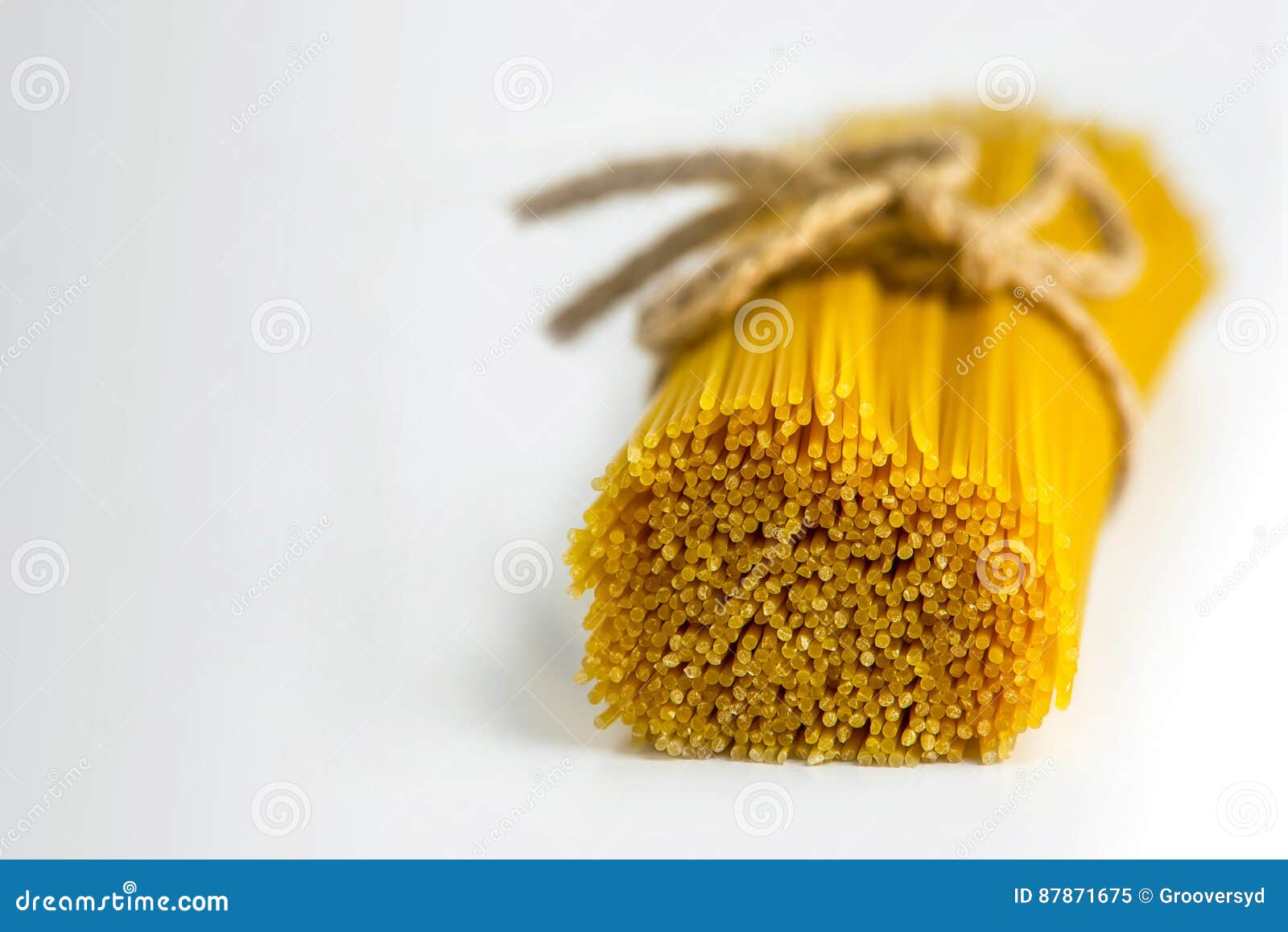 Raw pasta tied with a rope stock image. Image of macro - 87871675