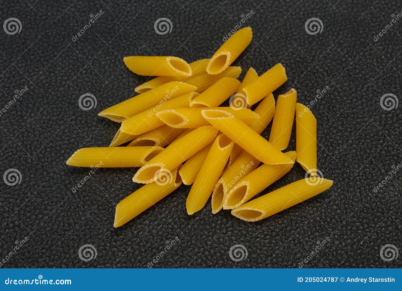 Raw penne pasta for bowl stock image. Image of penne - 205024787