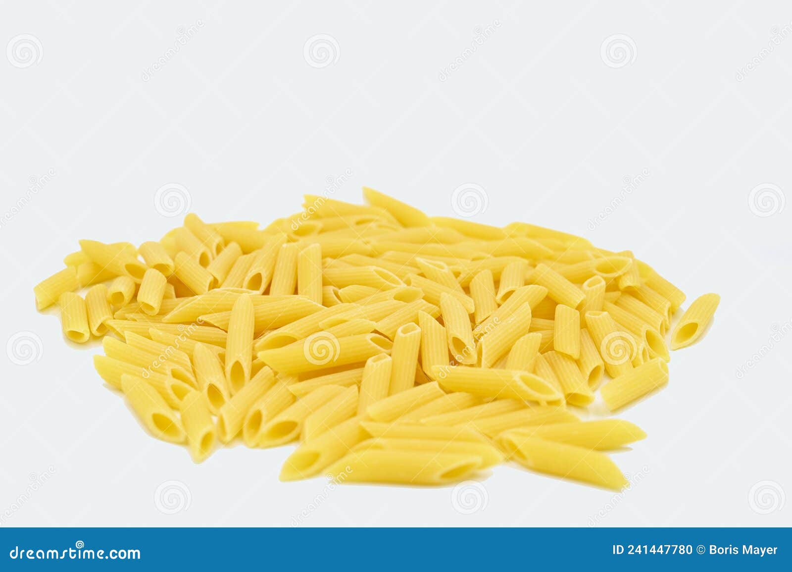 Raw Penne Rigate Pasta, Isolated on a White Background Stock Photo ...