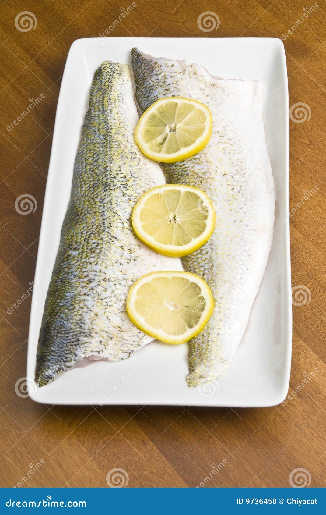 Raw Pickerel Fish Fillets with Sliced Lemon Stock Photo - Image of ...