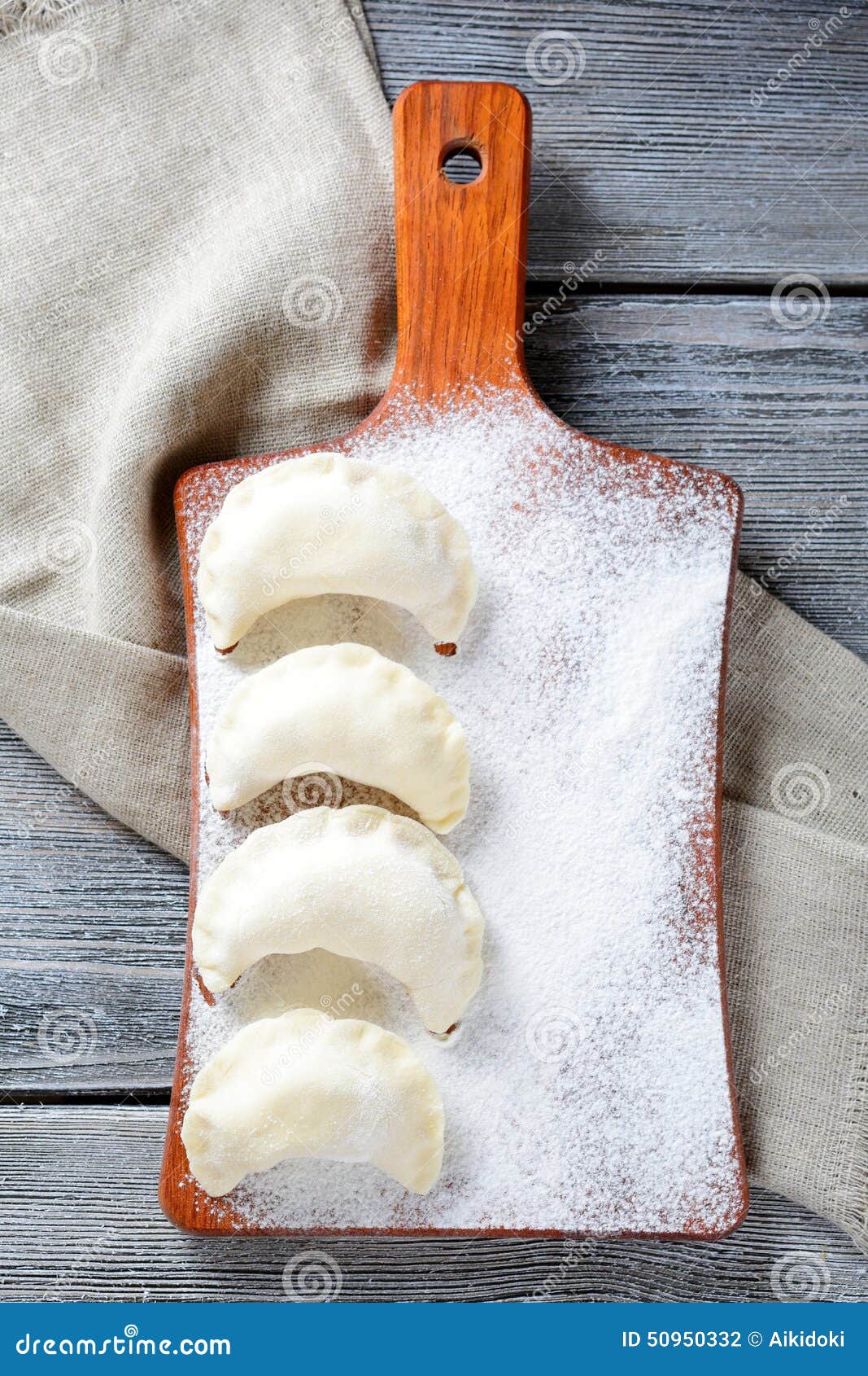 Raw Pierogi on a Cutting Board Stock Photo - Image of pierogi ...