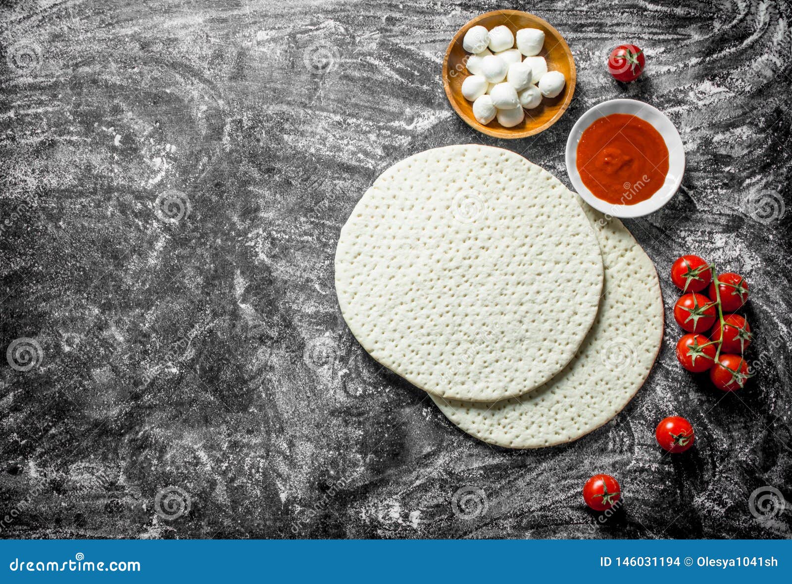 Raw Pizza. Rolled Out Dough with Tomato Paste, Tomatoes and Cheese ...