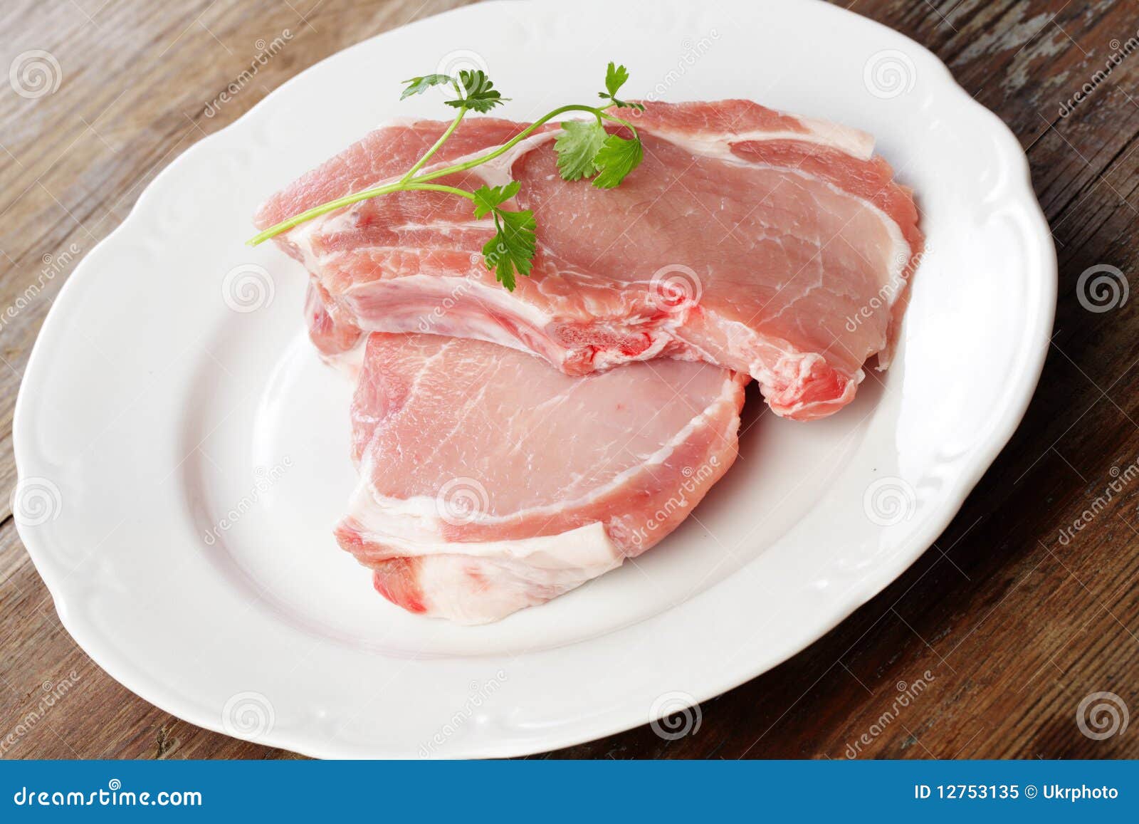 Raw pork cutlets stock image. Image of leaf, juicy, table - 12753135