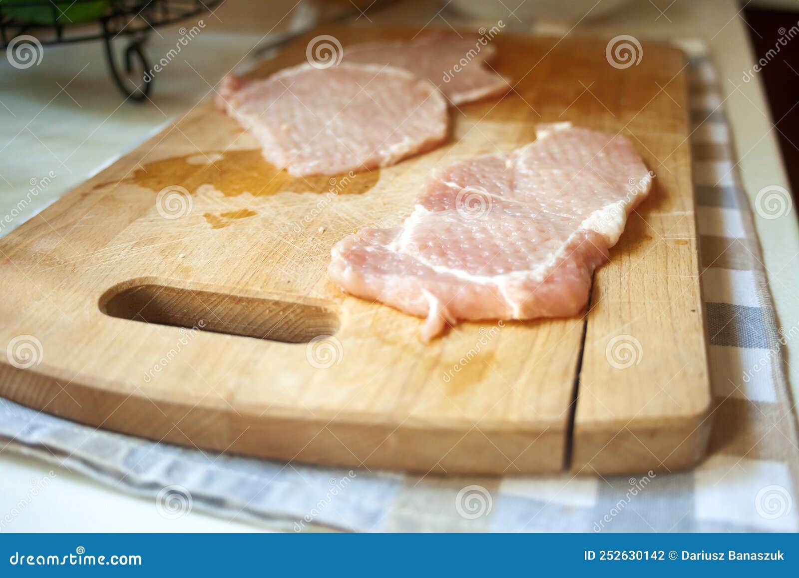 Raw Pork Loin Cutlets on a Board Stock Photo - Image of kitchen ...