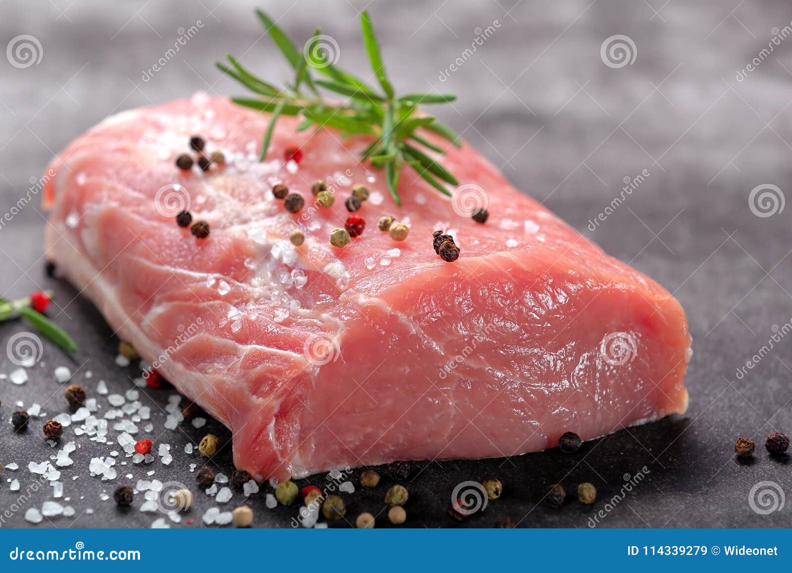 Raw pork loin with spices stock image. Image of preparation - 114339279