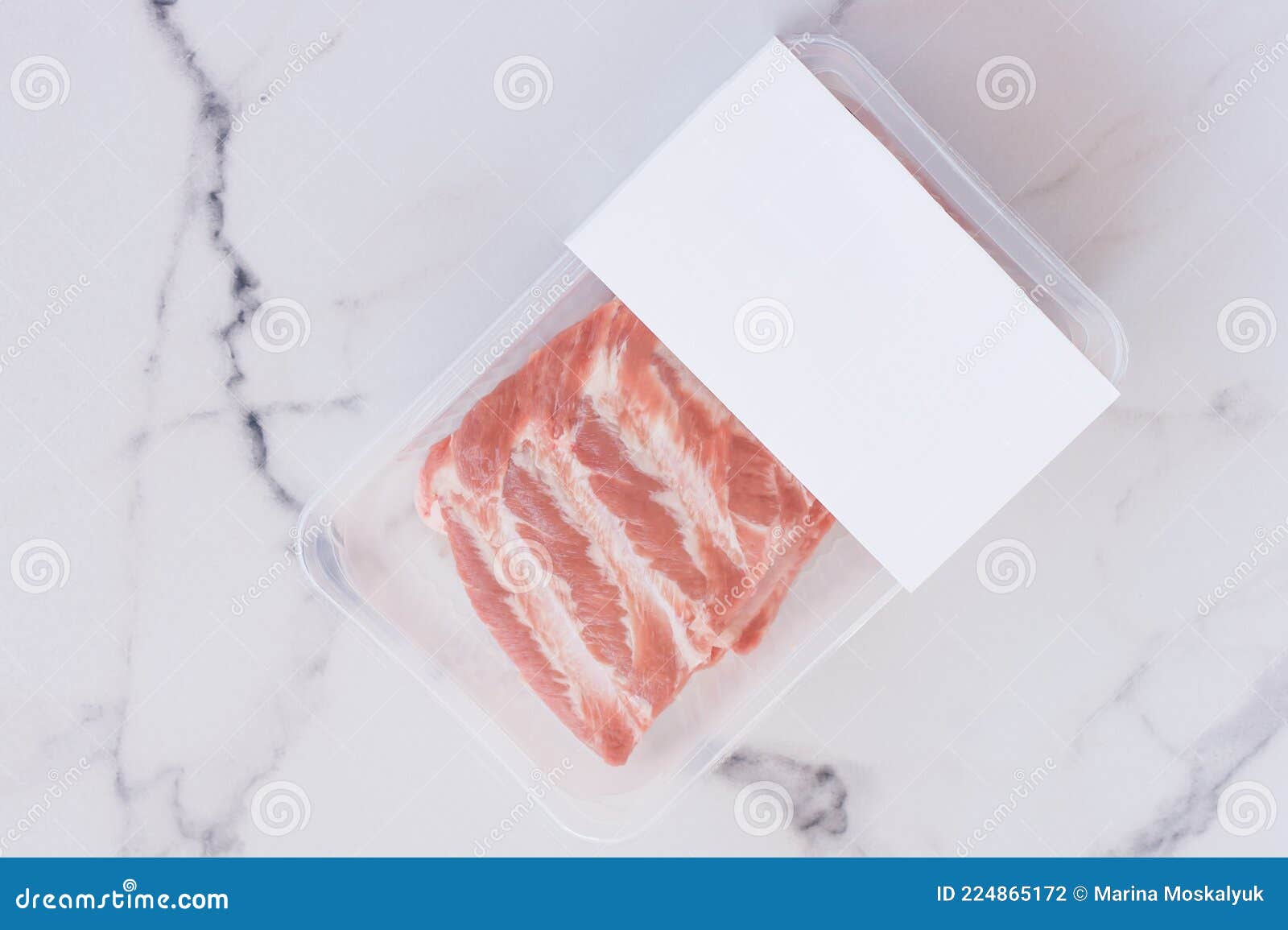 Raw Pork Ribs in Vacuum Packaging on Marble Background, Logo Mockup for ...