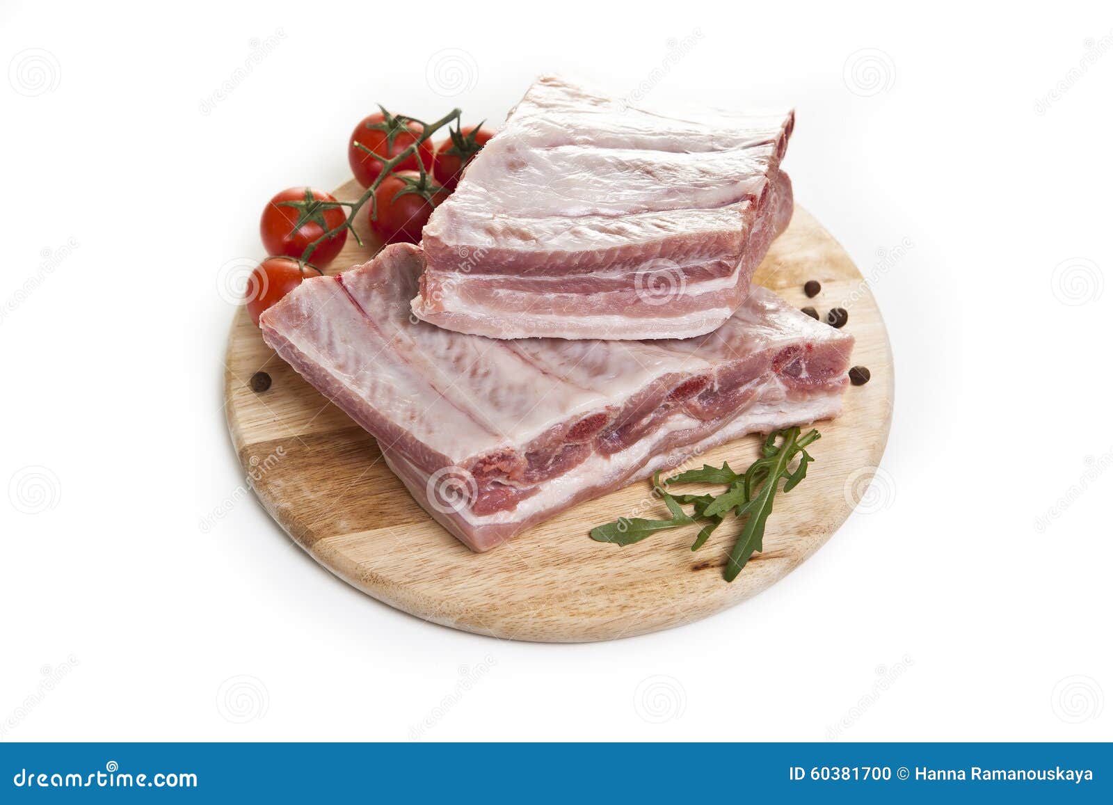 Raw Ribs on a Cutting Board Isolated on a White Background Stock Photo ...