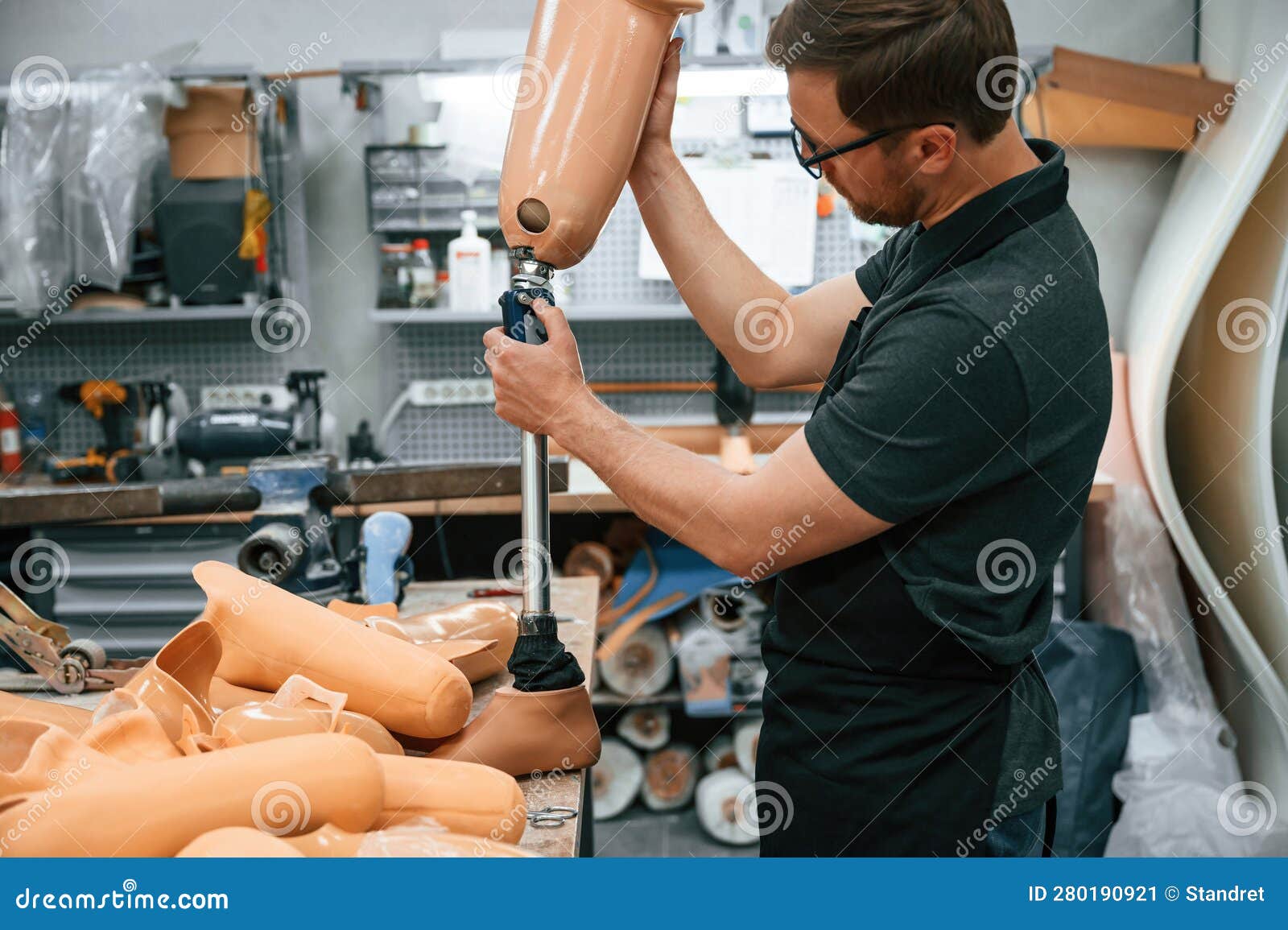 Raw Product for Prosthesis. Technician Working in Modern Laboratory ...