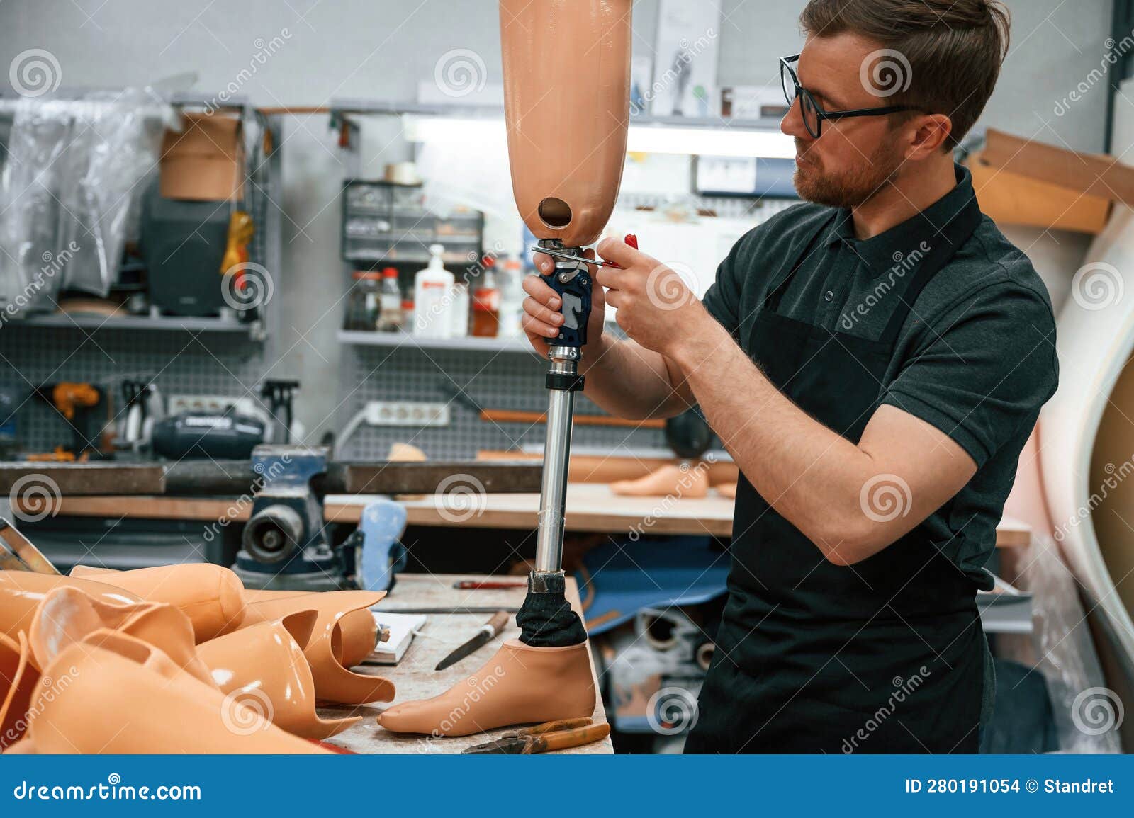 Raw Product for Prosthesis. Technician Working in Modern Laboratory ...