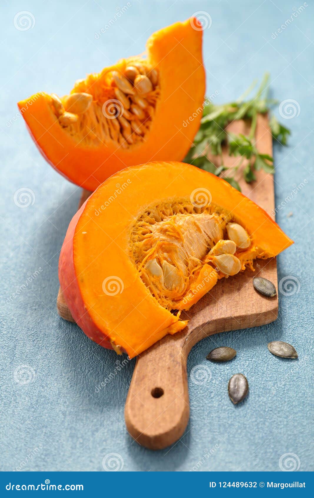 Raw pumpkin slices stock photo. Image of seasonal, background - 124489632