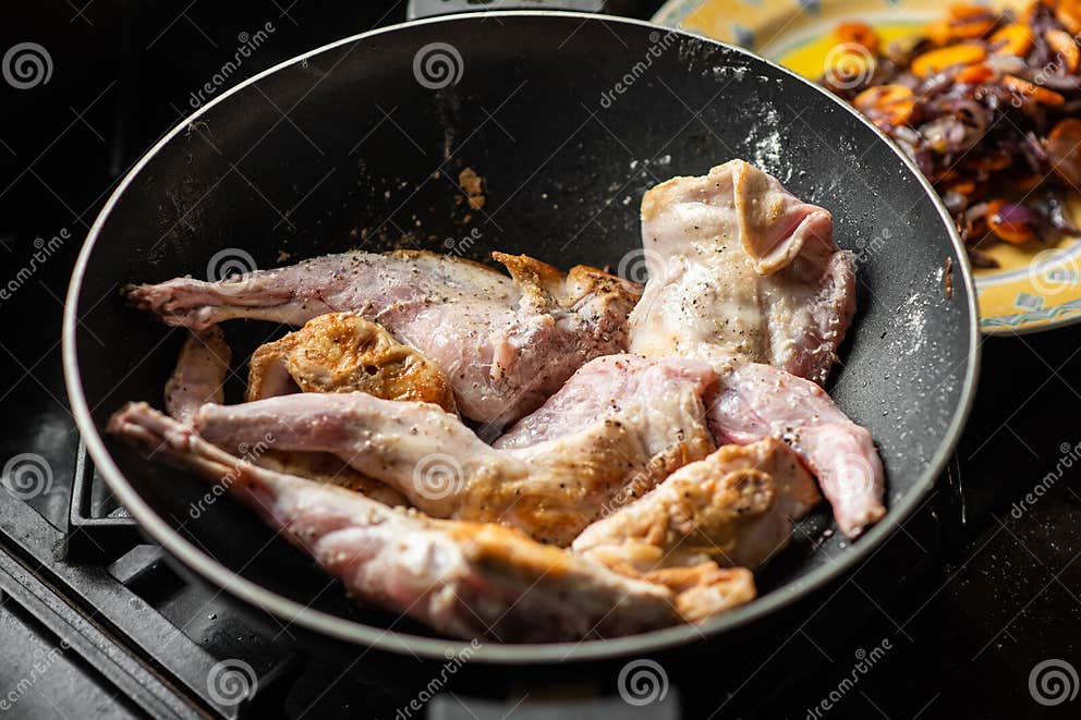 Raw Rabbit with Spices in a Pan. Cooking Stewed Rabbit Stock Image ...